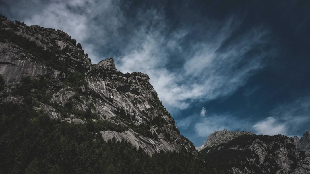 High mountain with trees under cloudy sky [3840x2160] | Scrolller