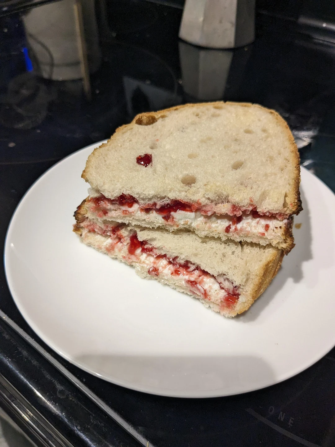 Cream Cheese, Raspeberry Preserves, Toasted Sourdough | Scrolller