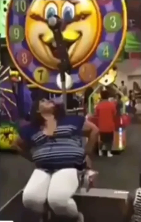 A grown woman breaking a Chuck E. Cheese ride meant for toddlers | Scrolller