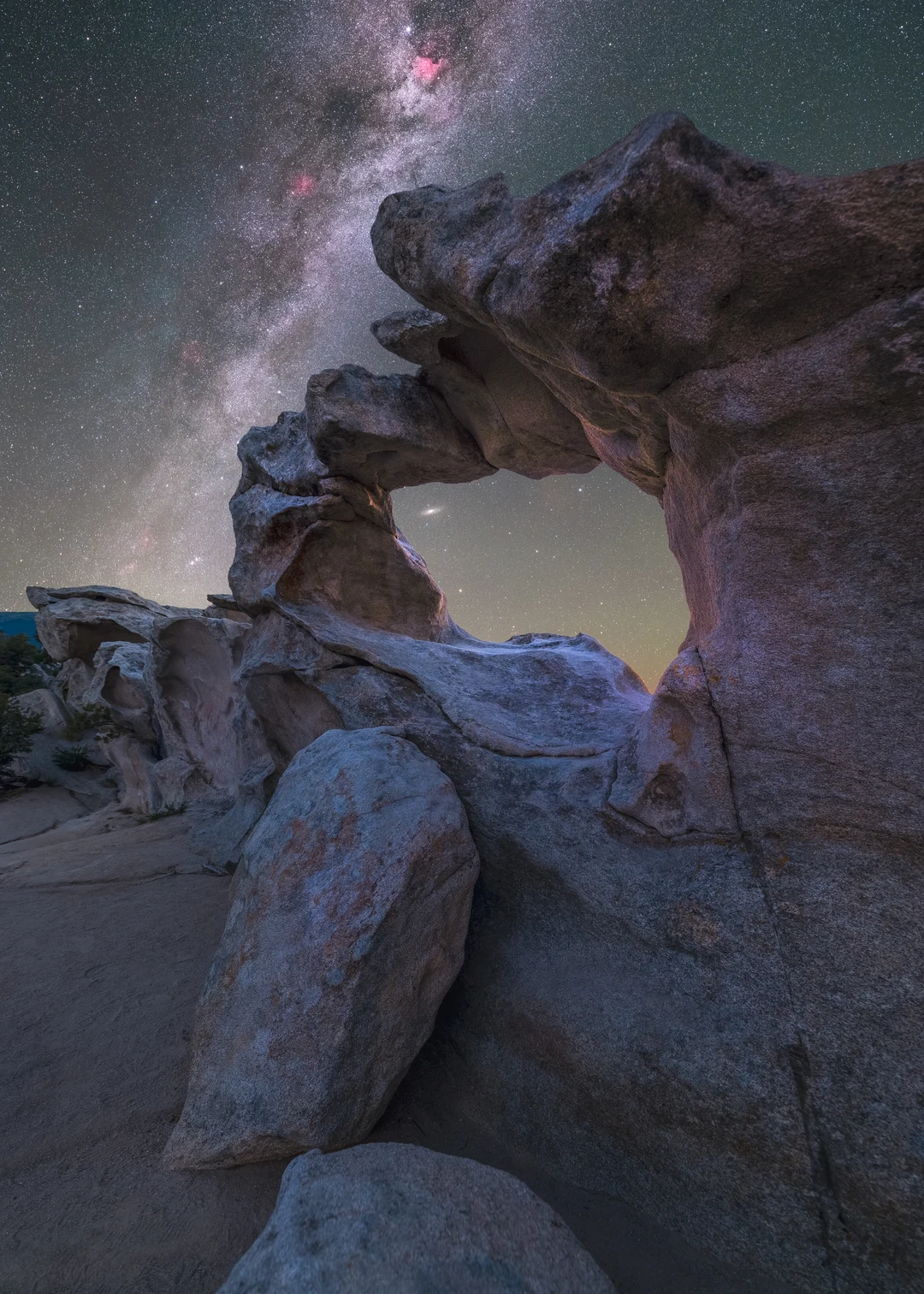 The Andromeda Galaxy rising through a rock arch formation in Southern Idaho [OC] [2048x2867 ...