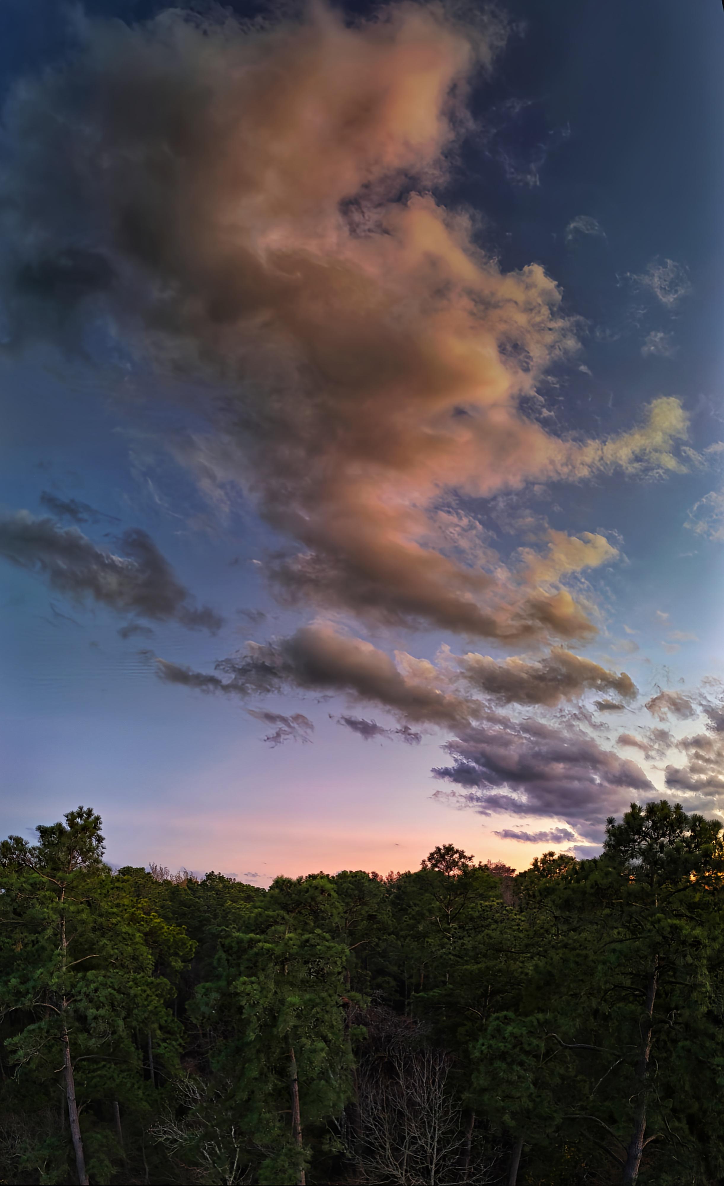 Passing Evening Clouds | Scrolller