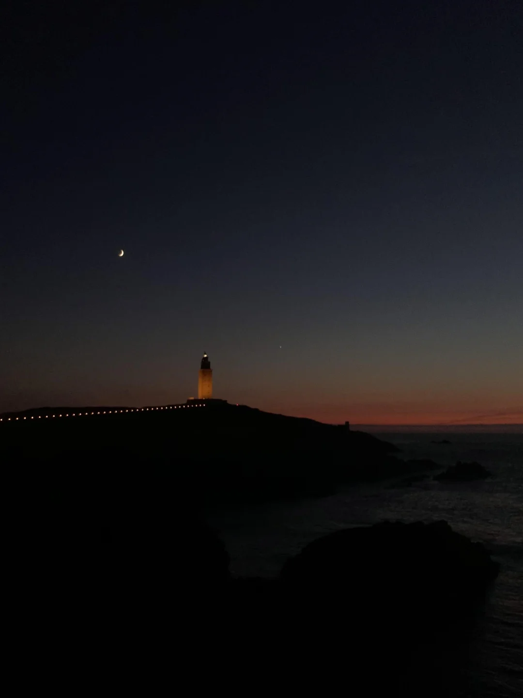 The Moon, Venus and the lighthouse [OC, Spain] | Scrolller