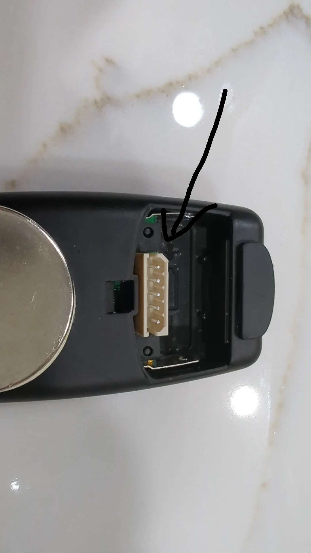 Does anyone know what this socket is for? This is inside my Chimney's remote controller. | Scrolller