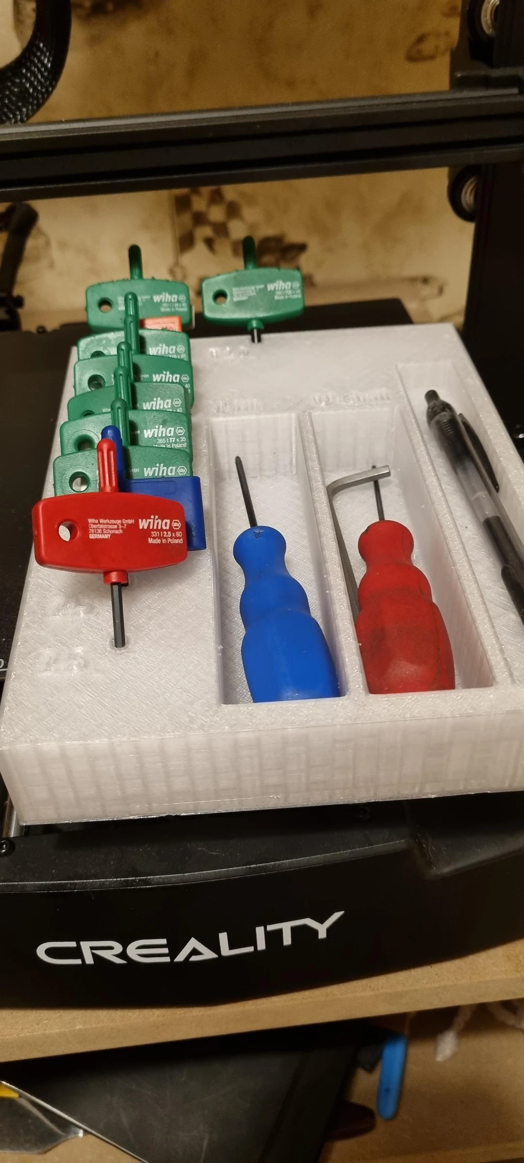 My first functional print is a holder for all the keys I need at work. I forgot about a 4mm Alan ...