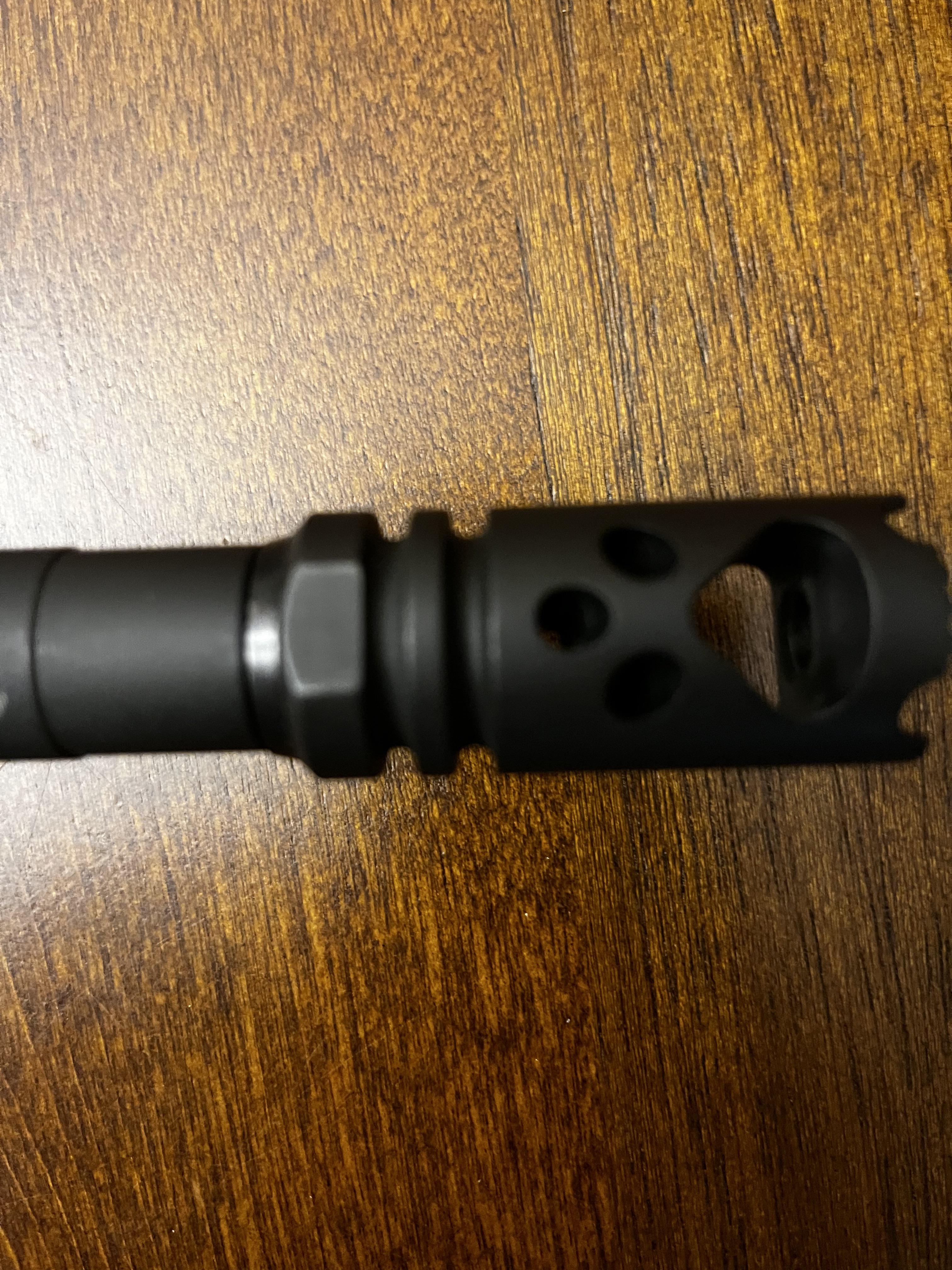 What muzzle device is this? | Scrolller