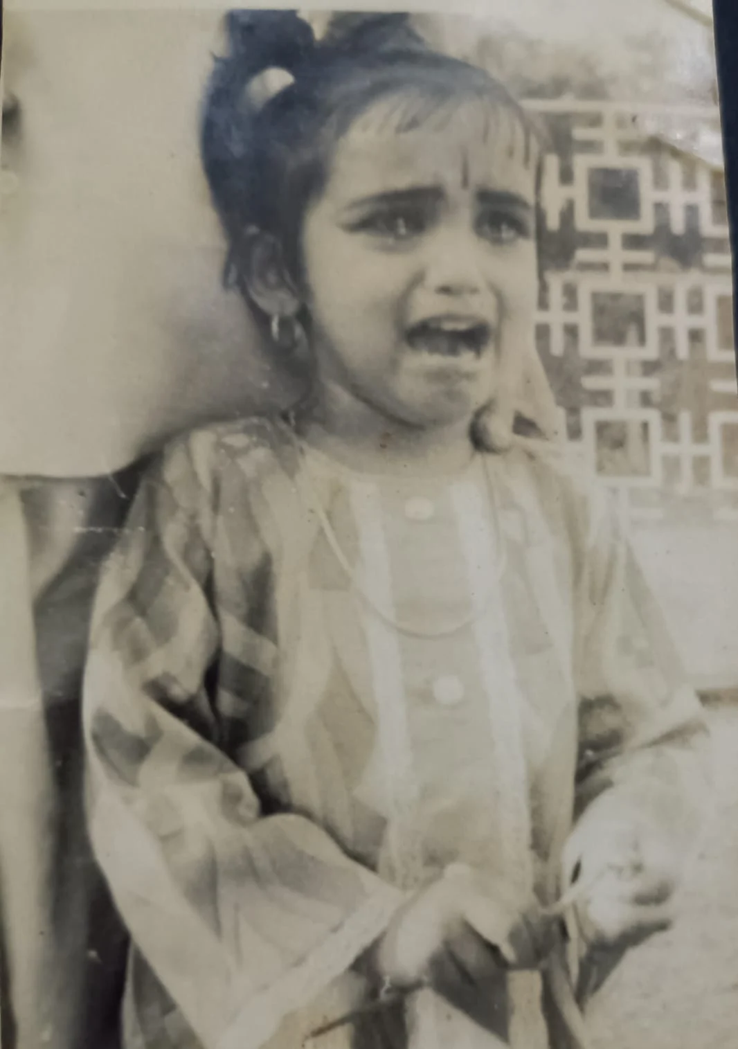 My mother crying because she's scared of the camera 1970s | Scrolller