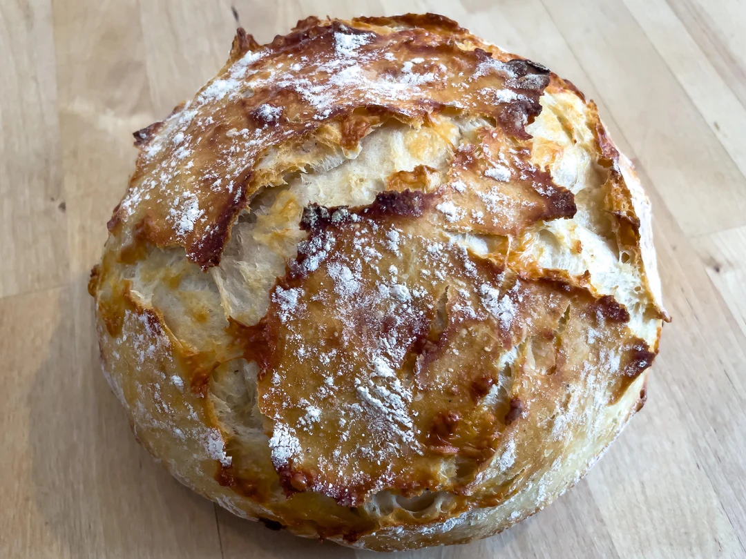 Parmesan and cracked black pepper loaf. | Scrolller