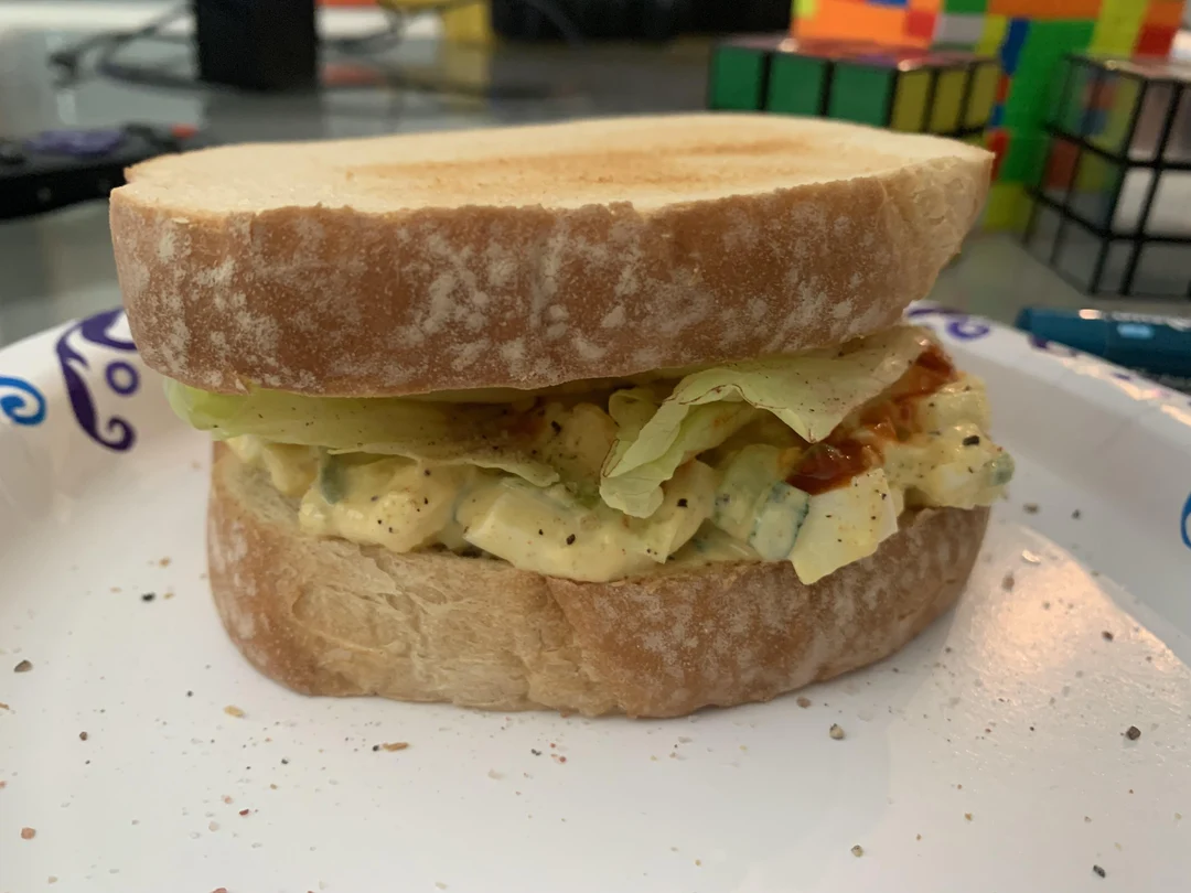 Egg salad sandwich with lettuce and sriracha | Scrolller