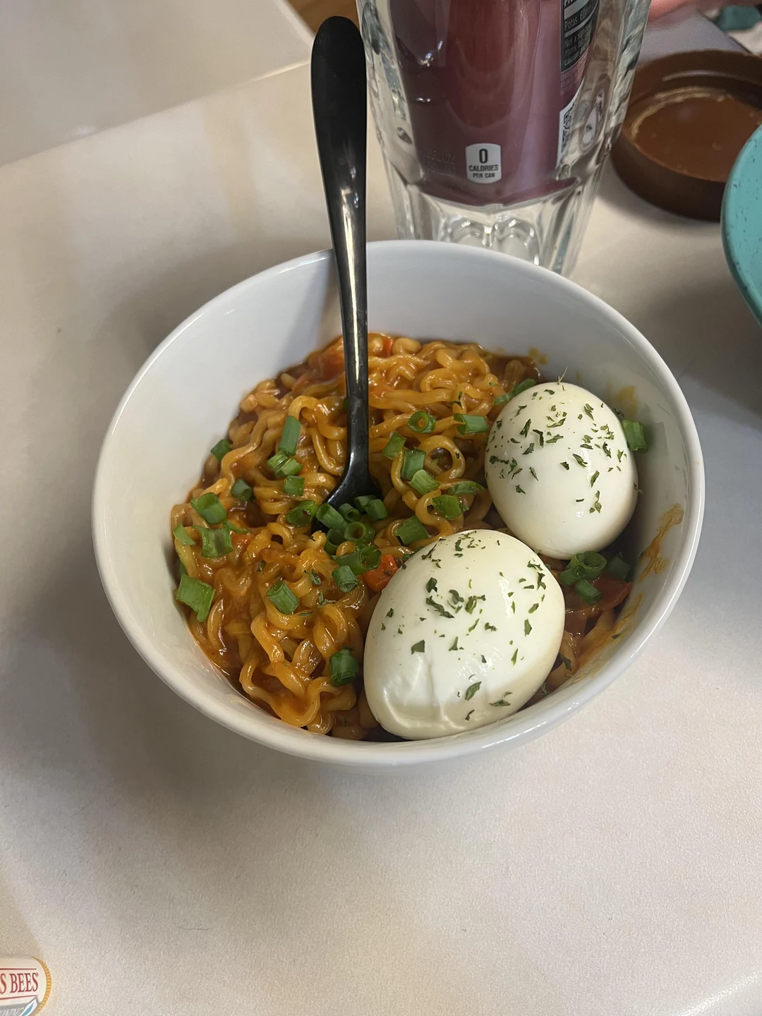 Curry Buldak with green onions and soft boiled eggs. | Scrolller