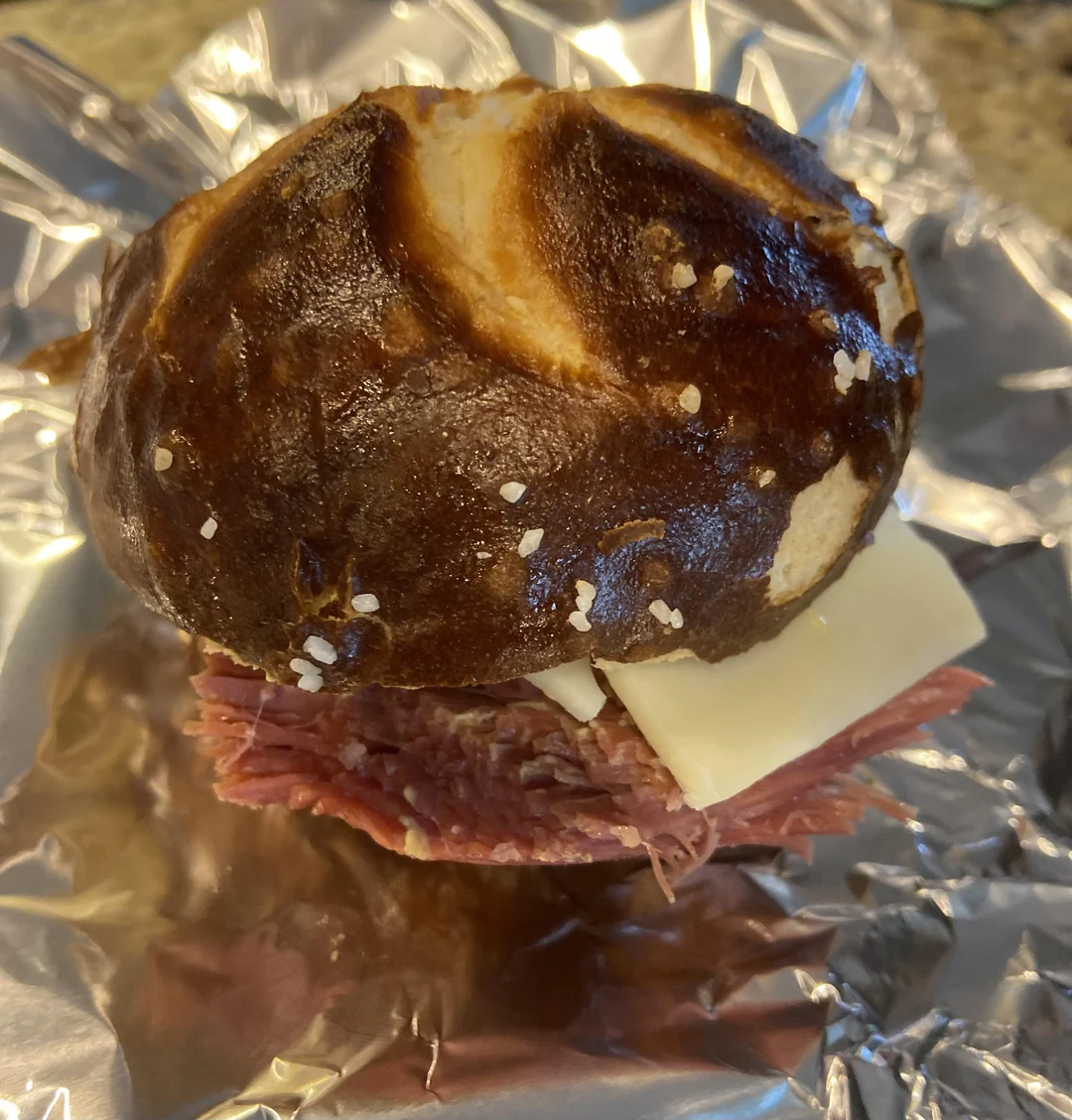 Homemade Corned beef brisket, Swiss and Dijon on a pretzel roll. | Scrolller