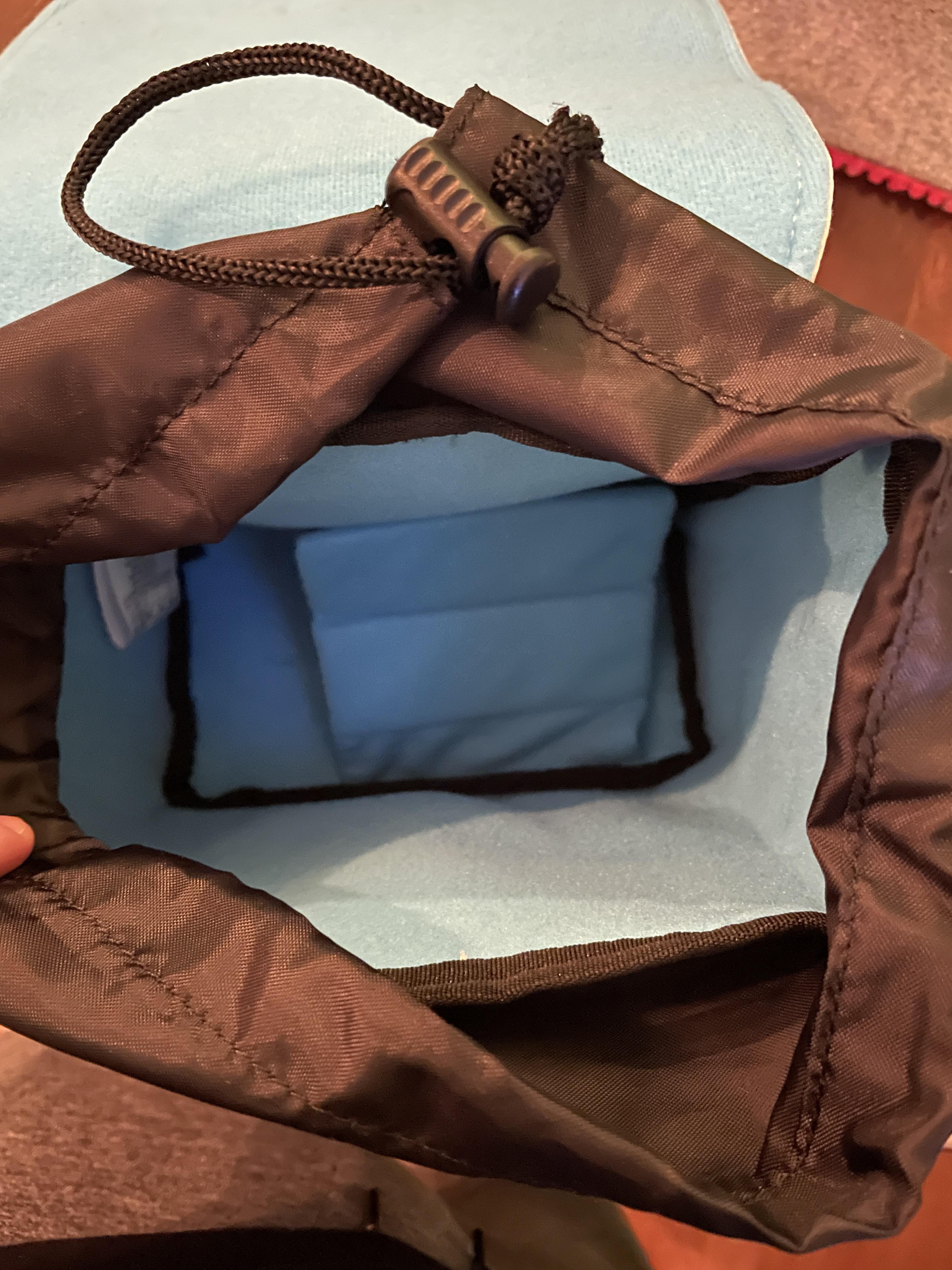 Polaroid box bag, what is this inside bottom Velcro strap for? Padding? | Scrolller
