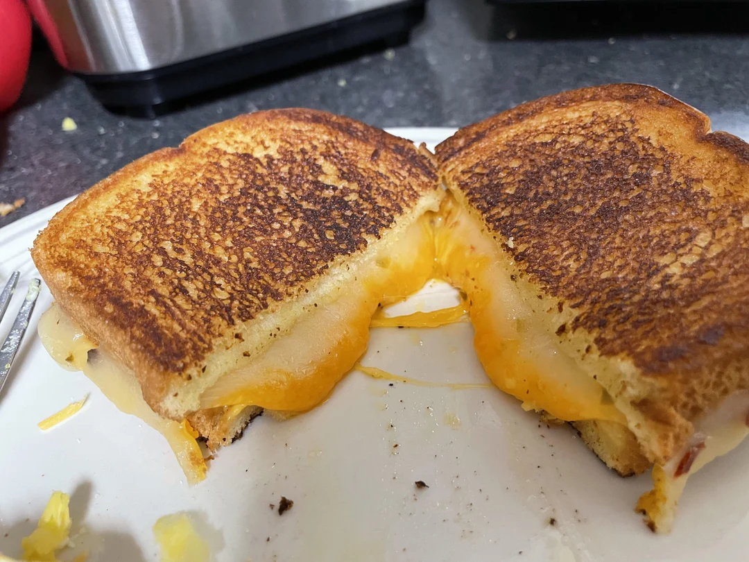 Cheddar, pepper jack and plastic on Hawaiian bread | Scrolller