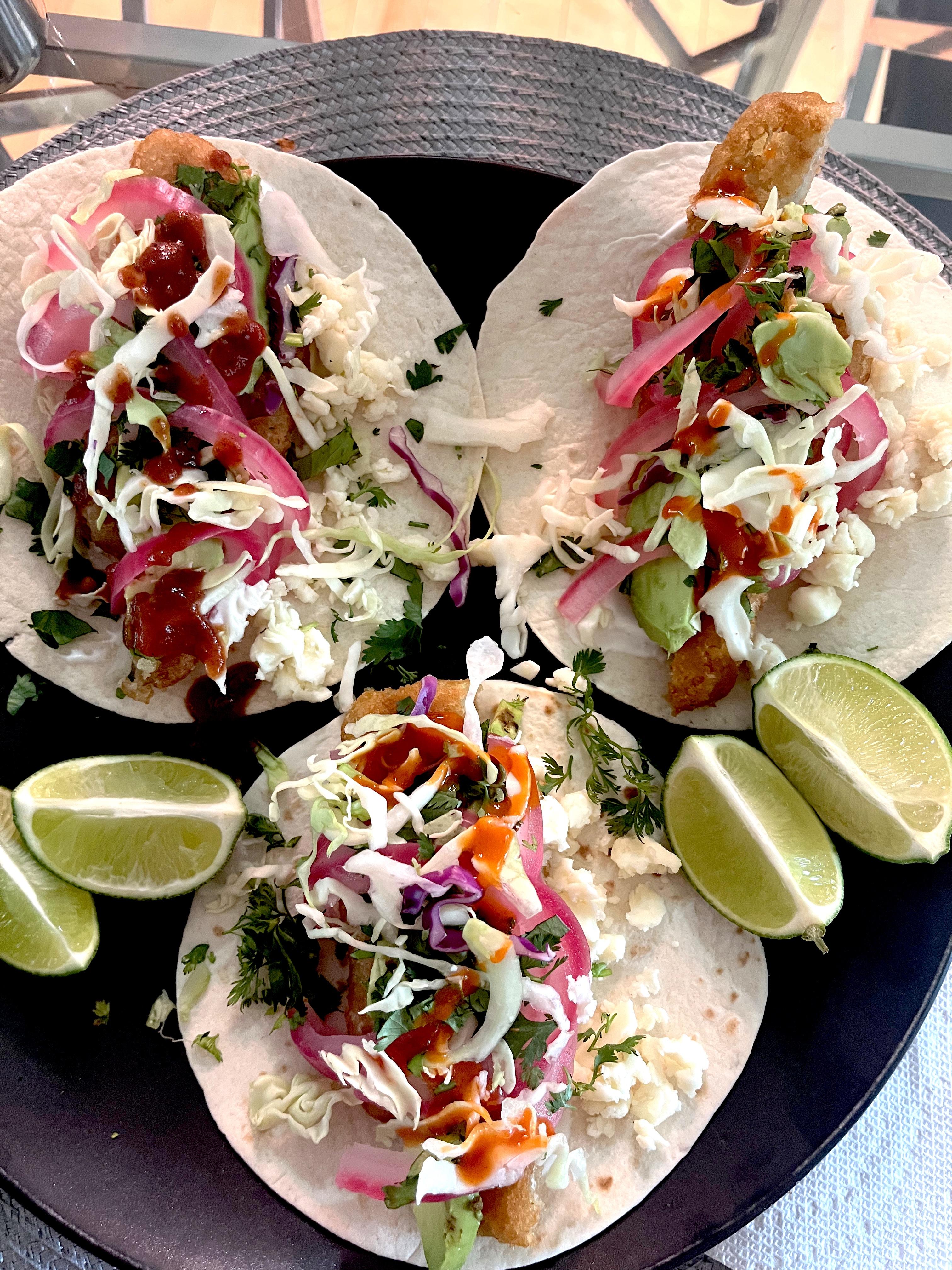 Fish tacos with cabbage, avocado, cotija, cilantro and pickled onion (and baby fish tacos ...