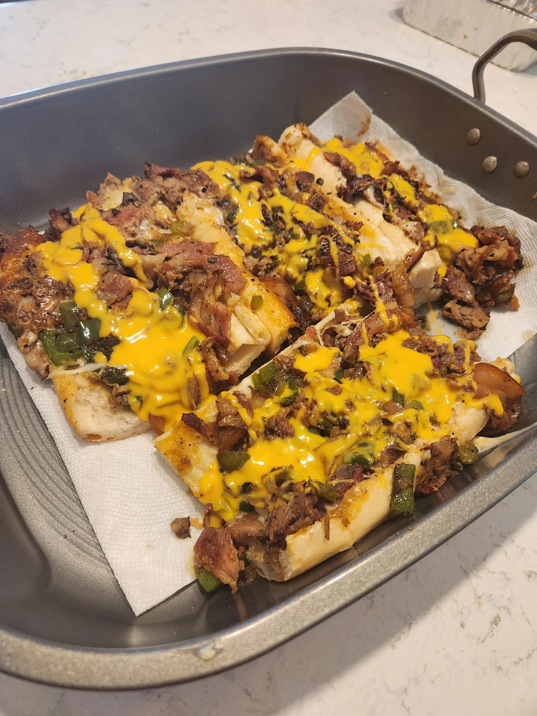 Smoked a prime rib, decided to turn it into Philly Cheesesteaks. | Scrolller