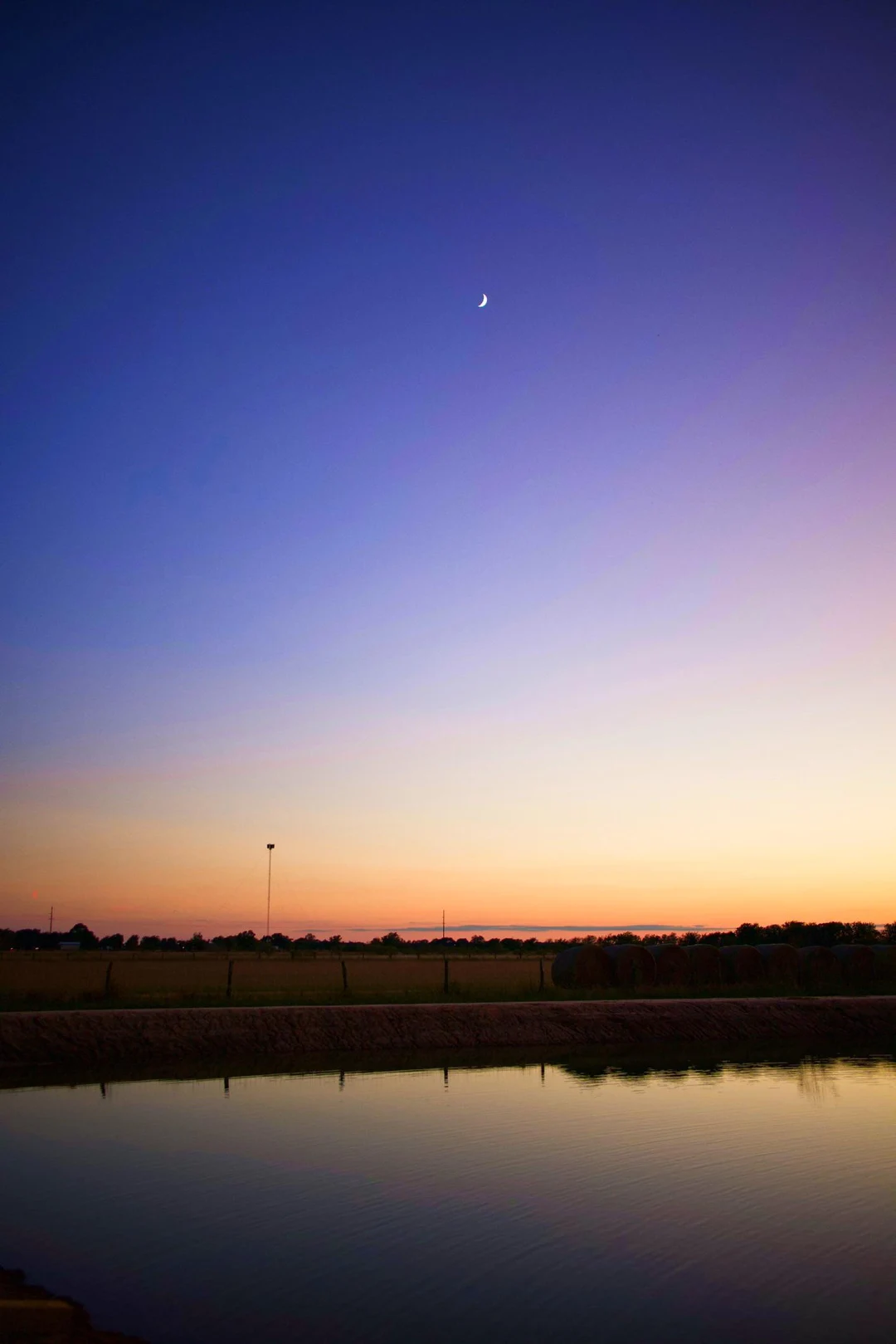 Sunset over a pond in South Texas | Scrolller