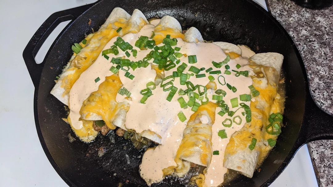 First time doing enchiladas in the cast iron, came out great! | Scrolller