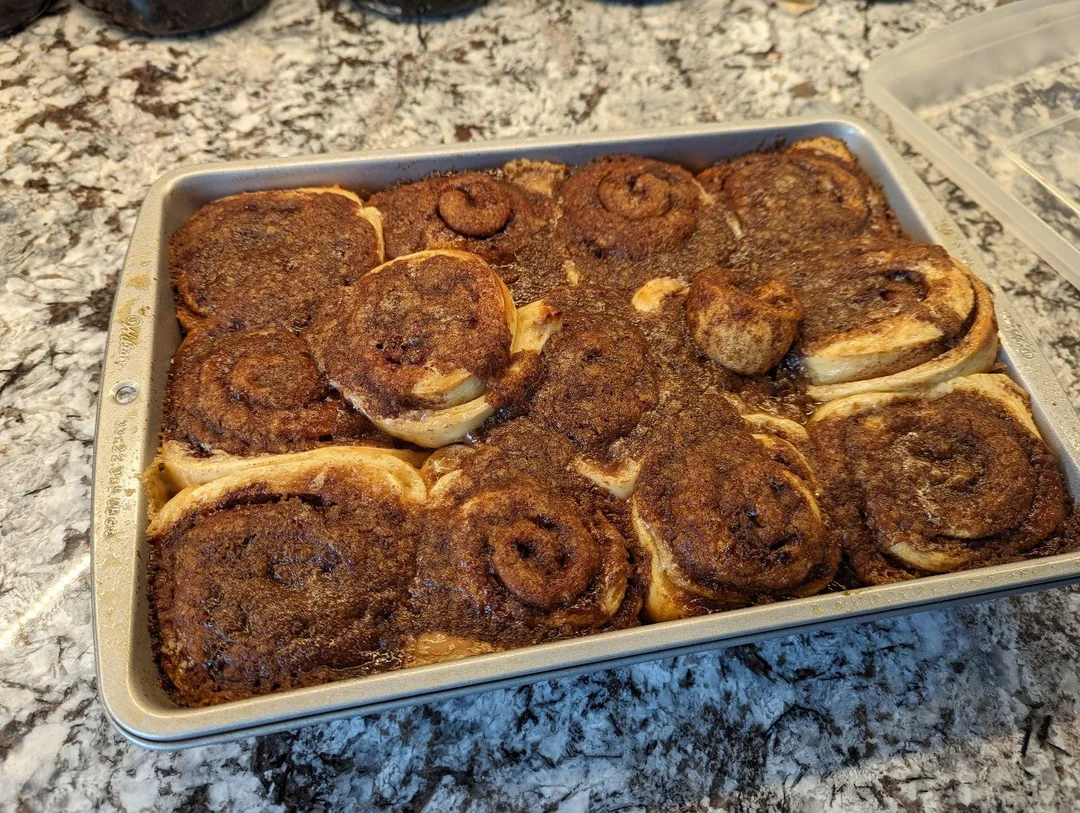 Cinnamon rolls with cinnamon crunch topping just out of the oven. | Scrolller