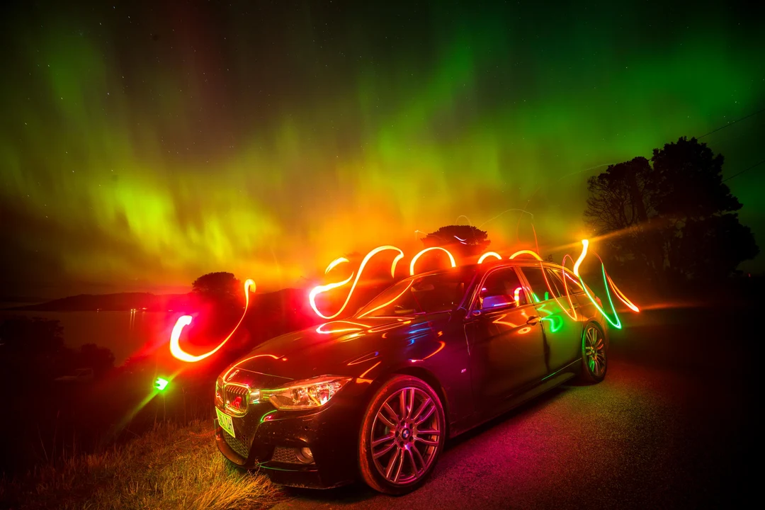 Painting with light around my (very dirty) F30 during an Aurora Australis. | Scrolller