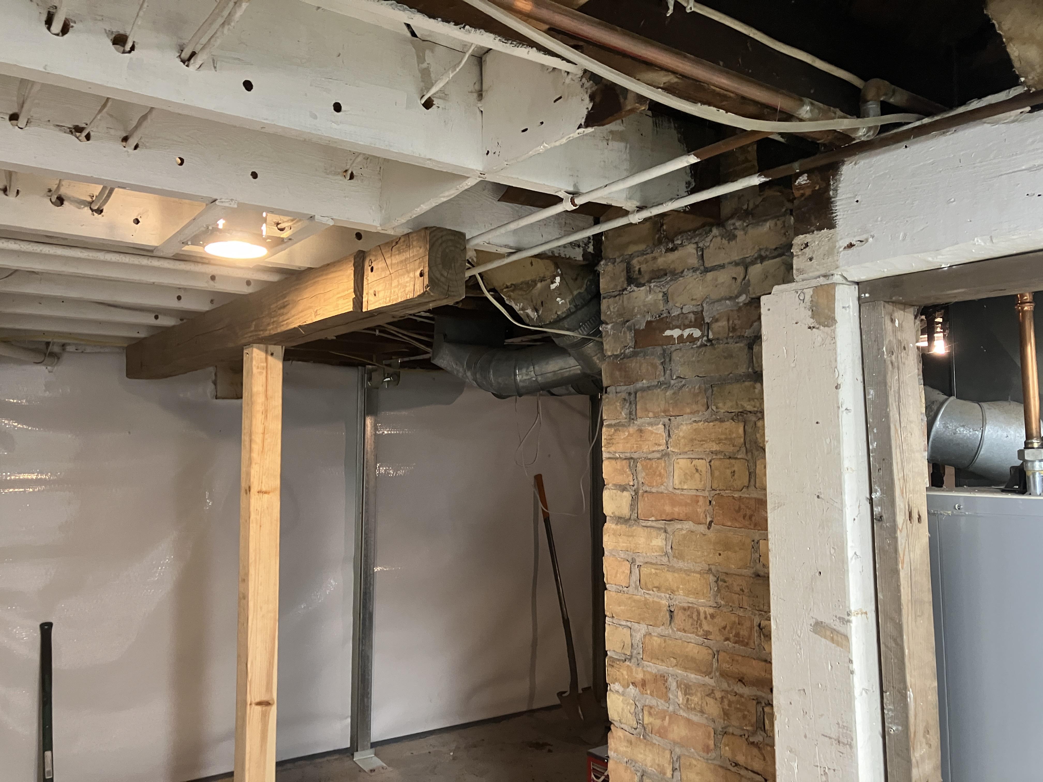 Main beam replacement/foundation wall stabilization | Scrolller