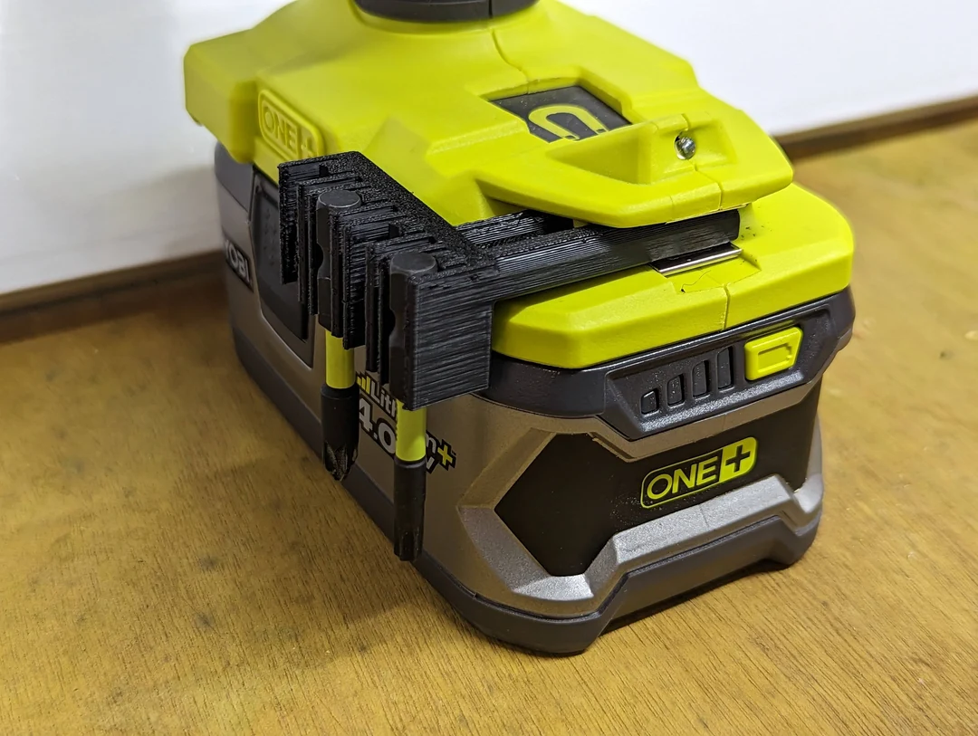 My first functional print, a comprehensive remix of a bit holder for my Ryobi impact driver ...