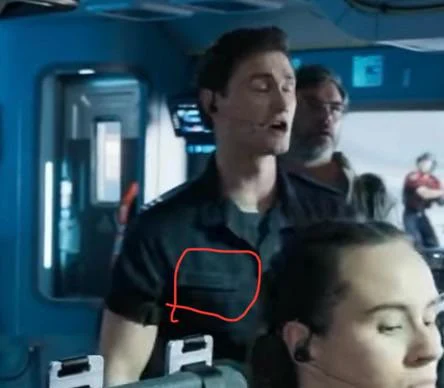 Can anyone read the name-tag of the SeaDragon First Mate? | Scrolller