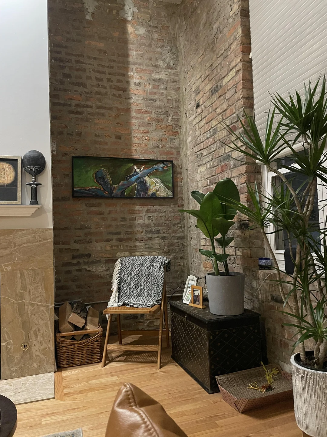 Cozy spot next to fireplace | Scrolller