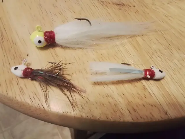 I made two white hair jigs to go with the brown feather jig. | Scrolller