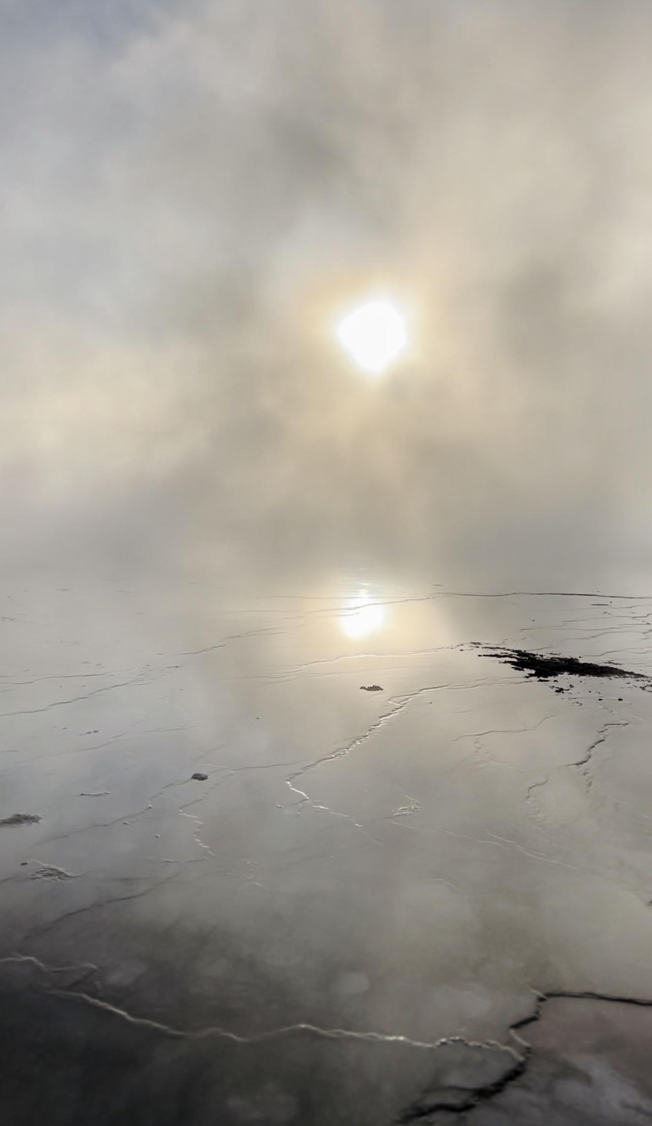 Grand Prismatic Spring right before sunset on a cold day in May | Scrolller