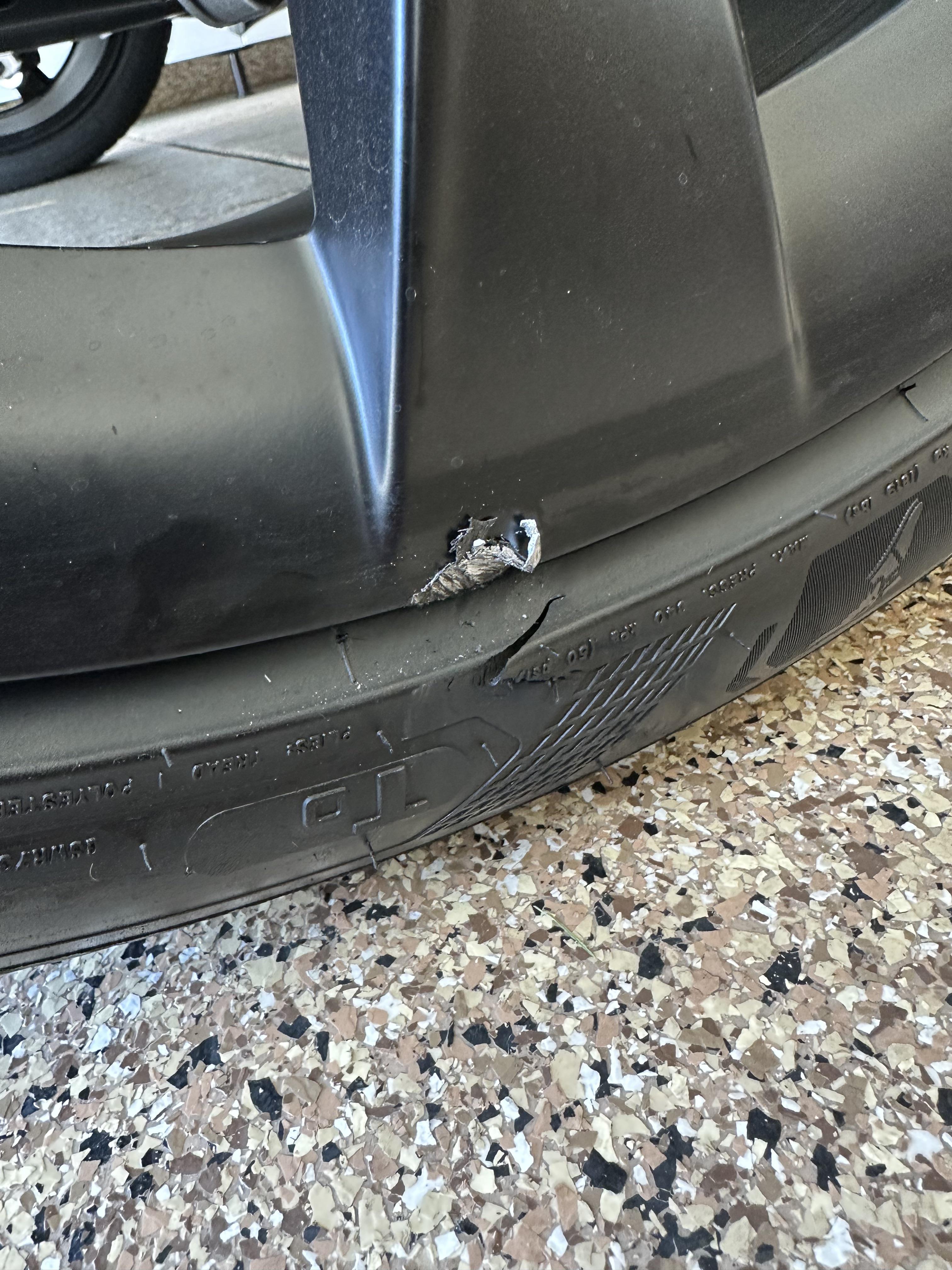 Hit a curb and got a tear on the tire. Does it need to be replaced? | Scrolller
