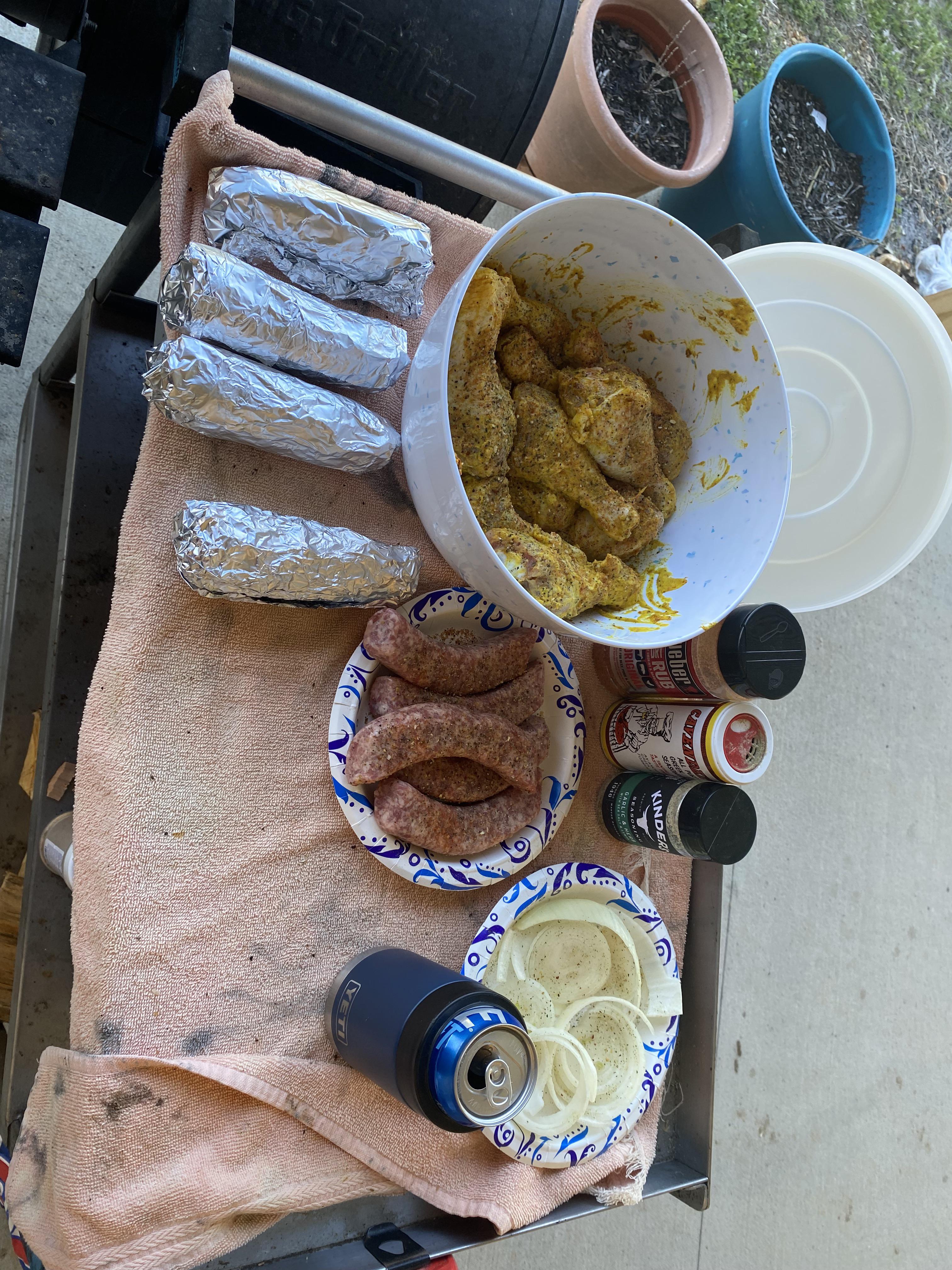 Chicken legs, brats, and corn on the cob. Not all seasonings pictured lol | Scrolller