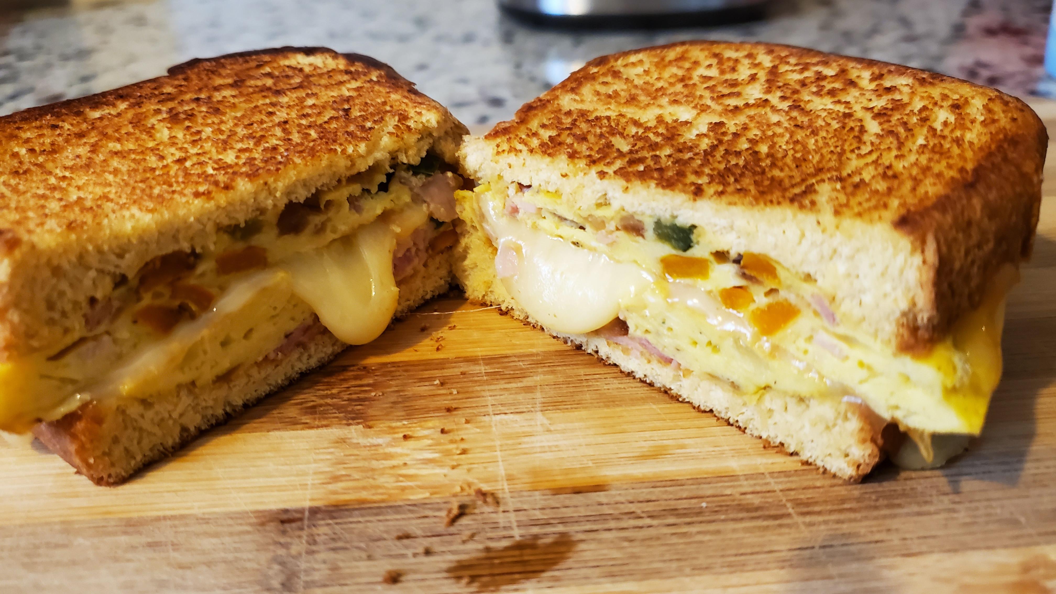 Discover more like Food: Western egg omelette melt with white American cheese on potato bread ...