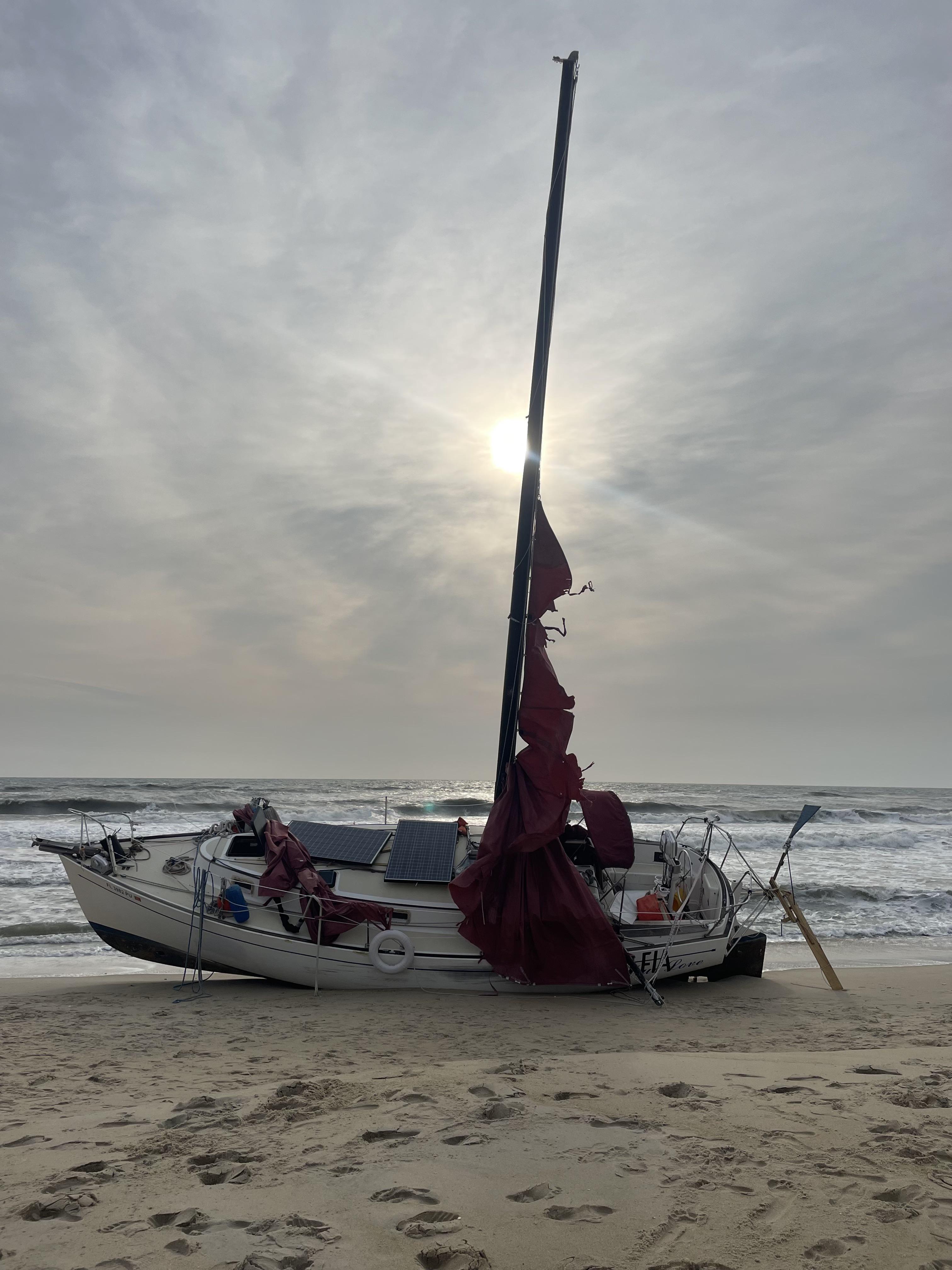 Sailboat abandoned & beached in the Outer Banks, NC | Scrolller