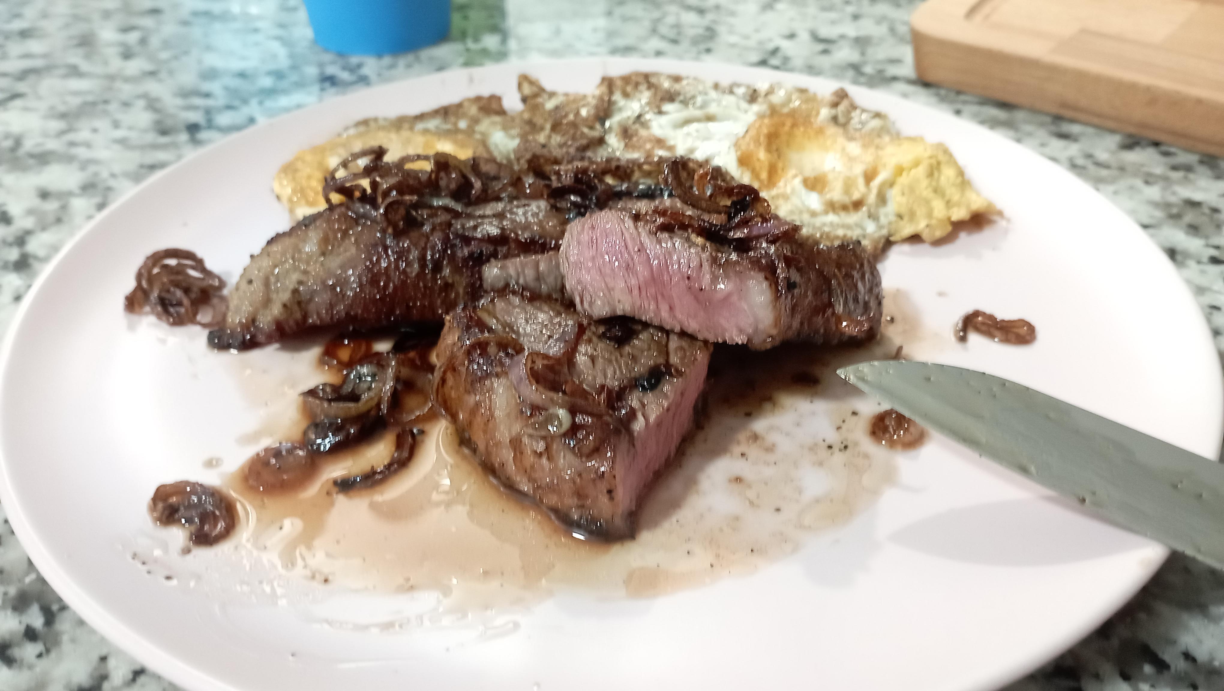 Angus Picana with onions and eggs | Scrolller