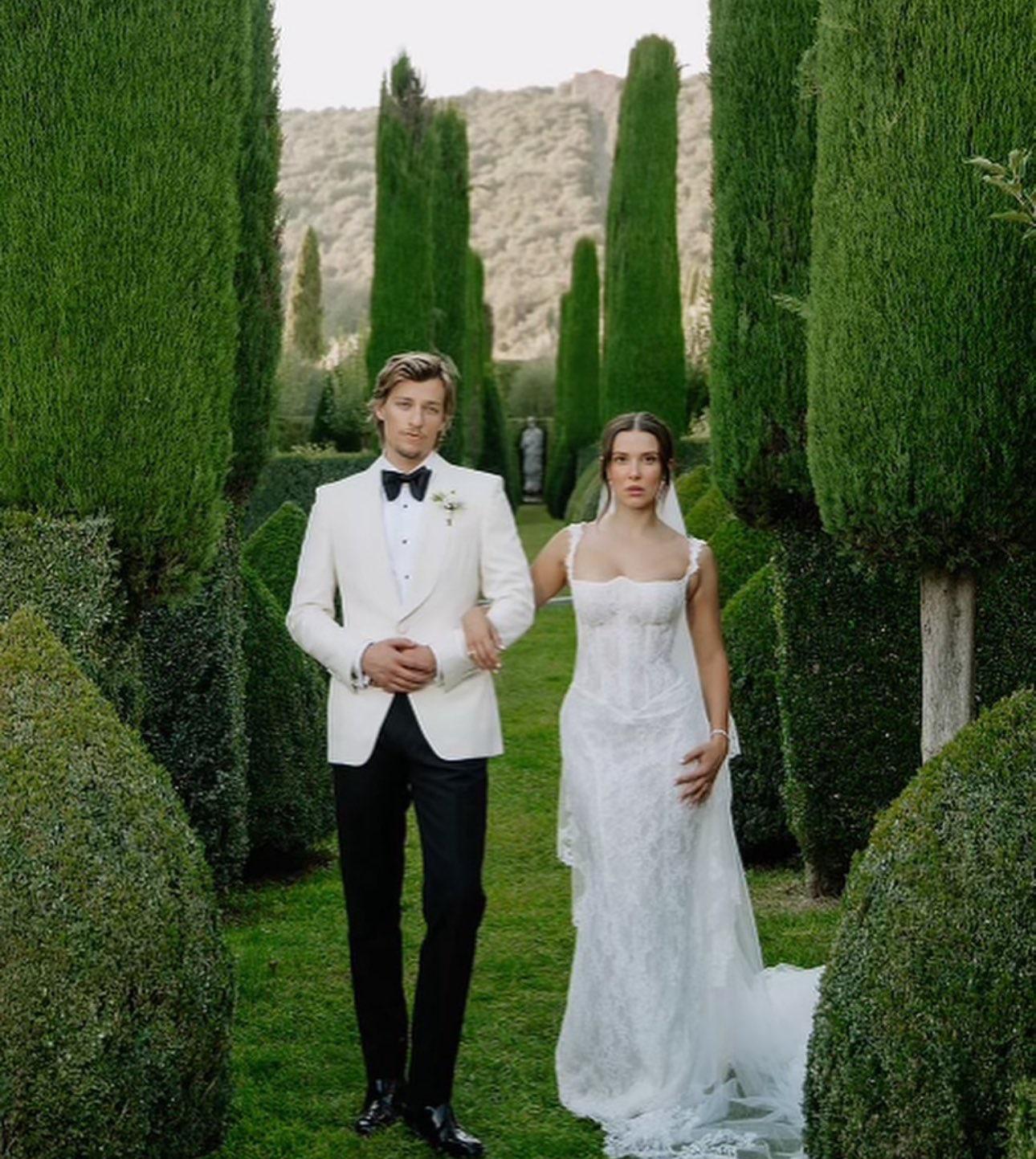 Millie Bobby Brown and Jake Bongiovi at their wedding. | Scrolller