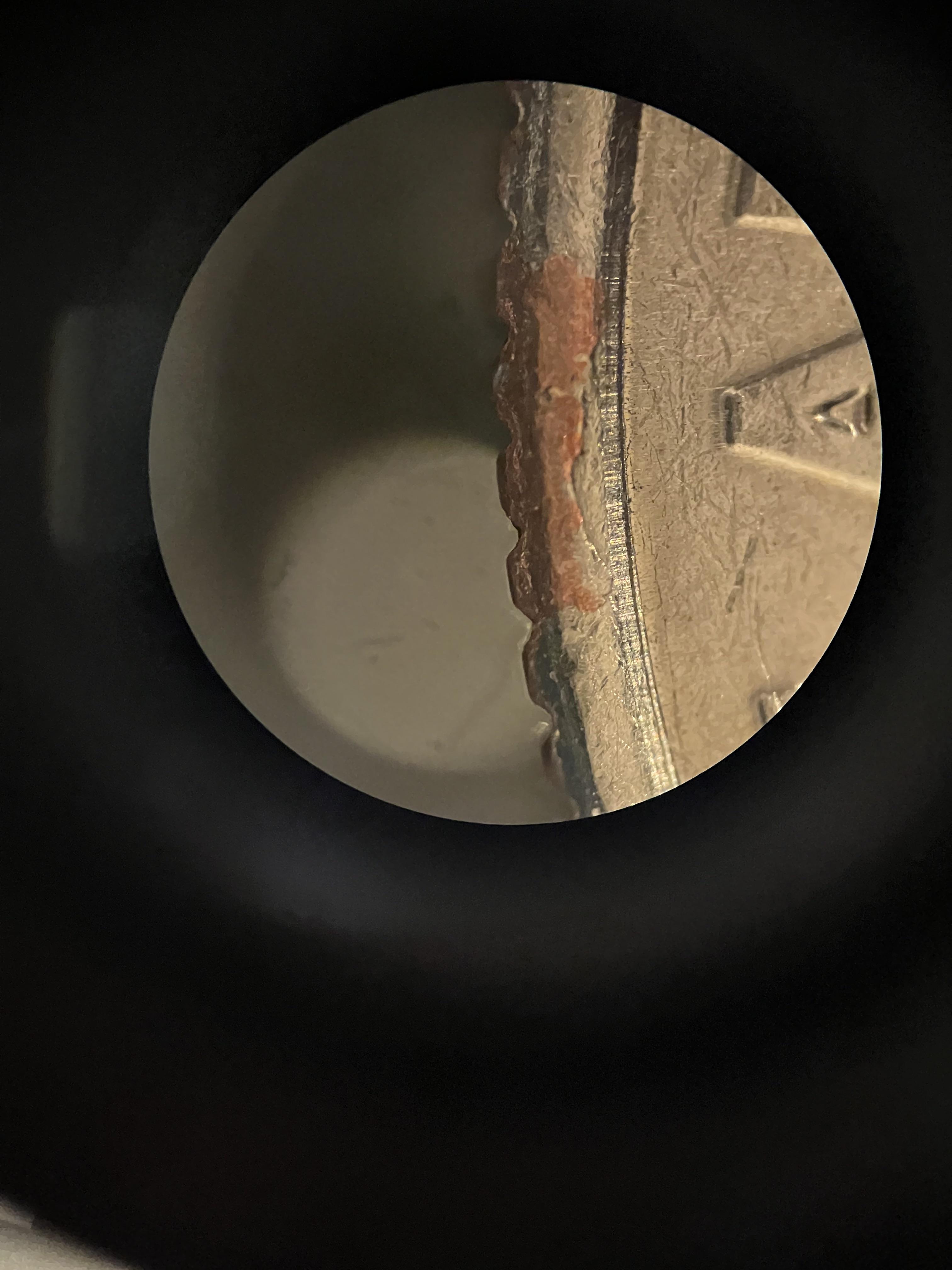 What’s up with the copper core coming up over the edge here? Post mint damage? | Scrolller