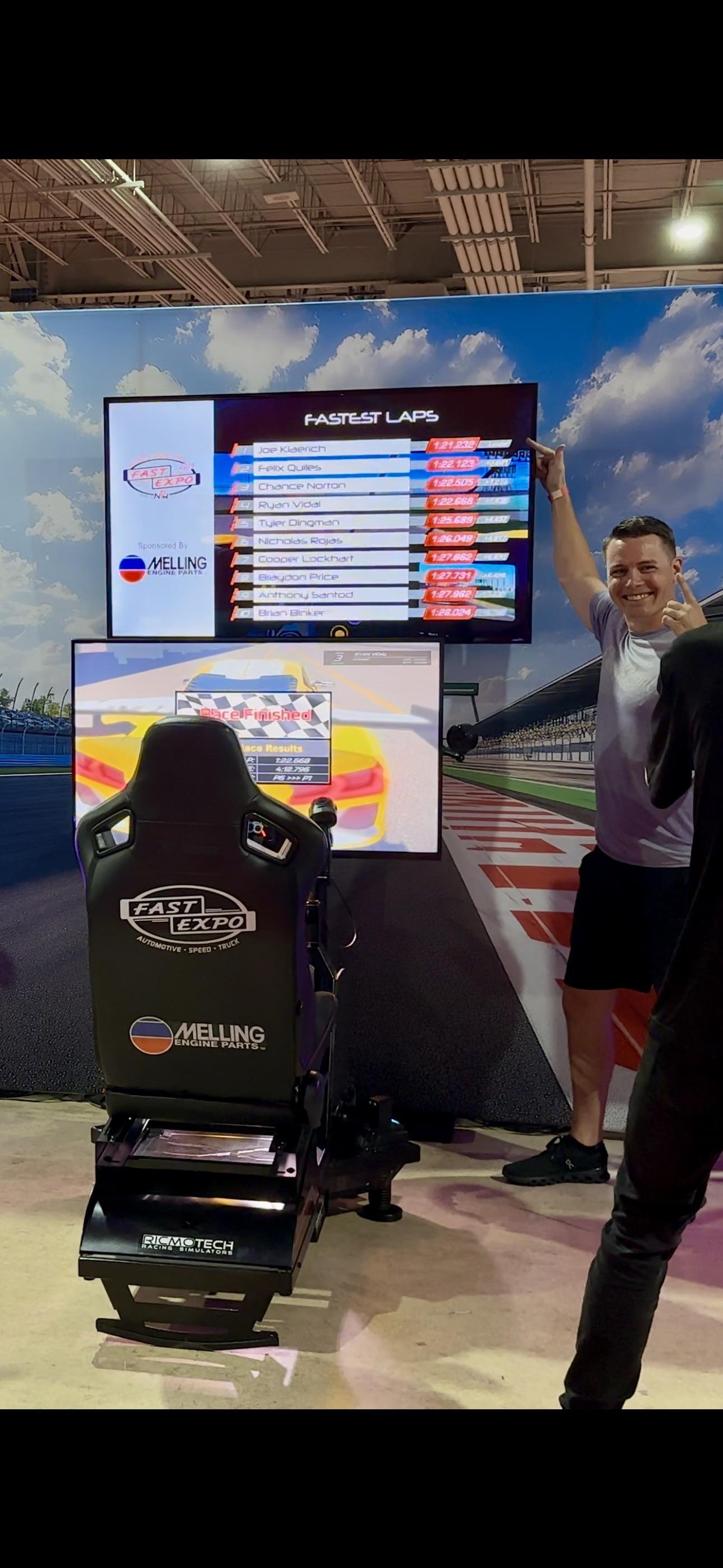 Went to an auto expo that had sim racing and won myself a brand new 65” TV! | Scrolller