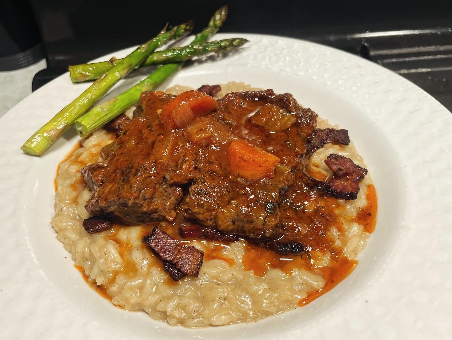 [homemade] Braised short ribs in a ragu, served with mushroom risotto topped with crispy bacon ...