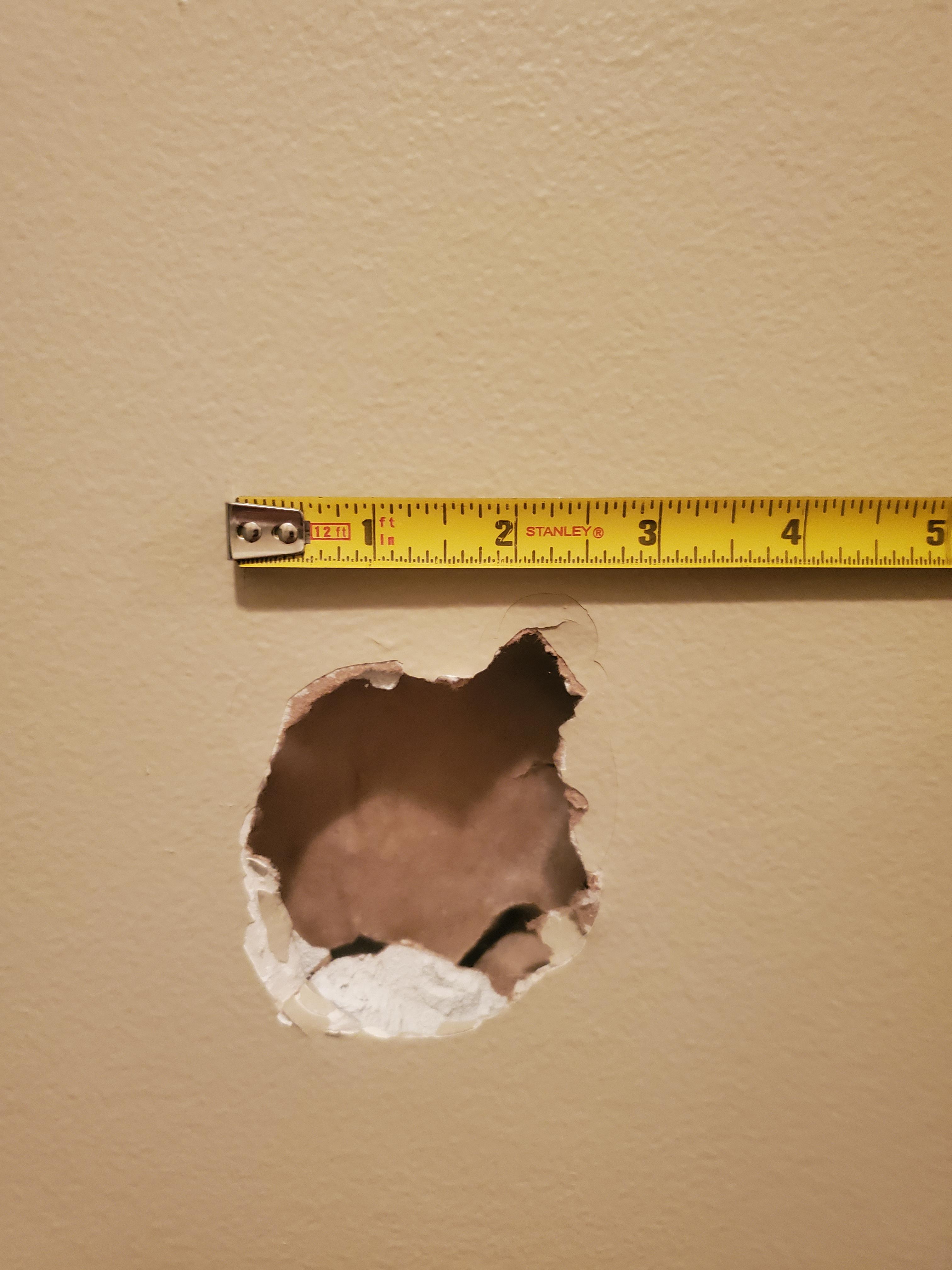 Patch kit (picture 3) or cut out a section and drywall repair? | Scrolller