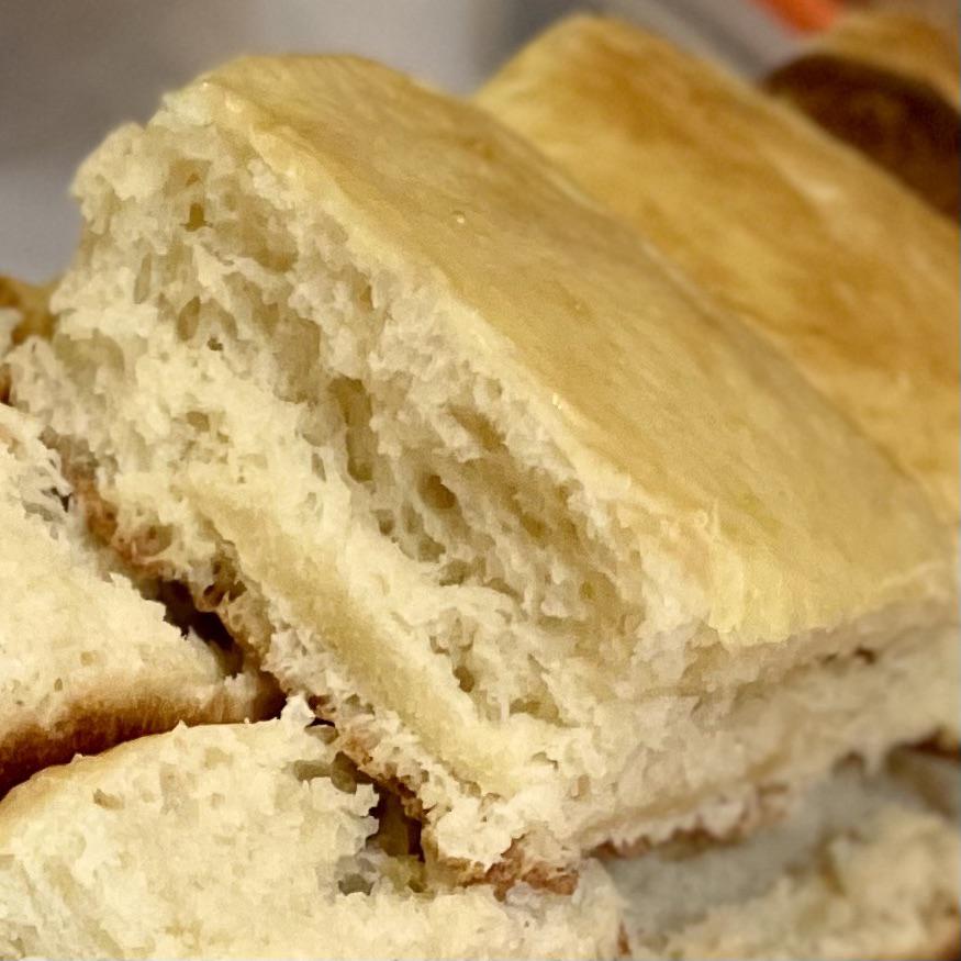 Egg wash affecting rise? These two rolls are from the same batch of dough, but one was topped ...