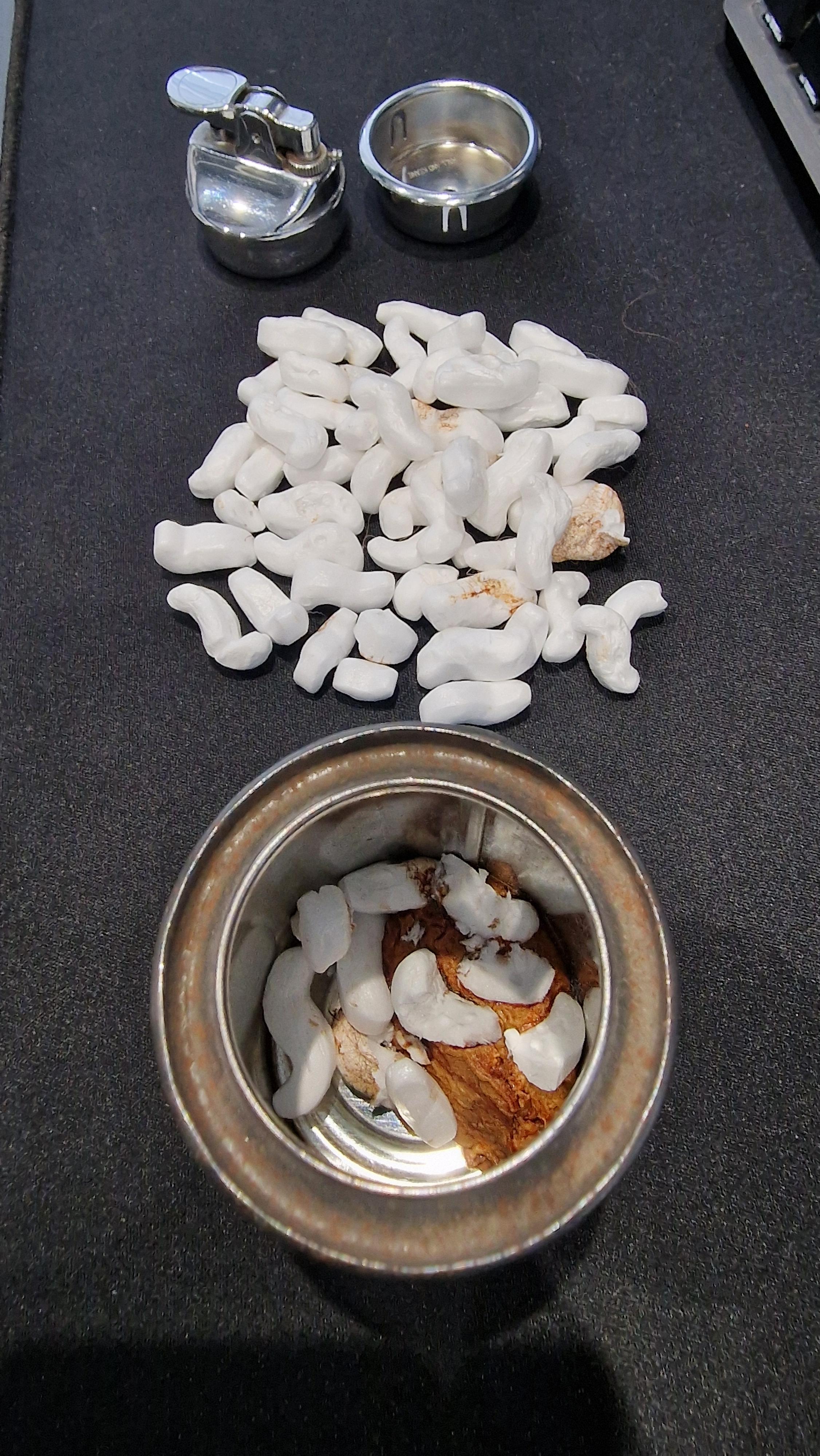 Strange brown mass in old lighter bought at Charity Shop | Scrolller