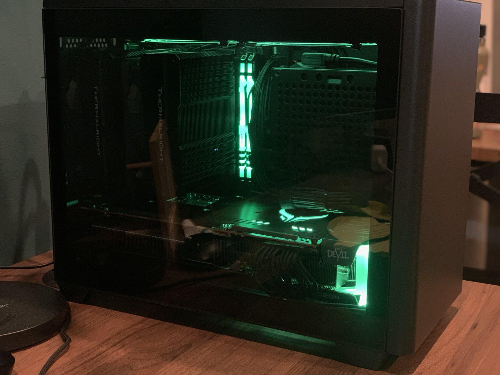 Sleek Black NR200P Build with RGB | Scrolller