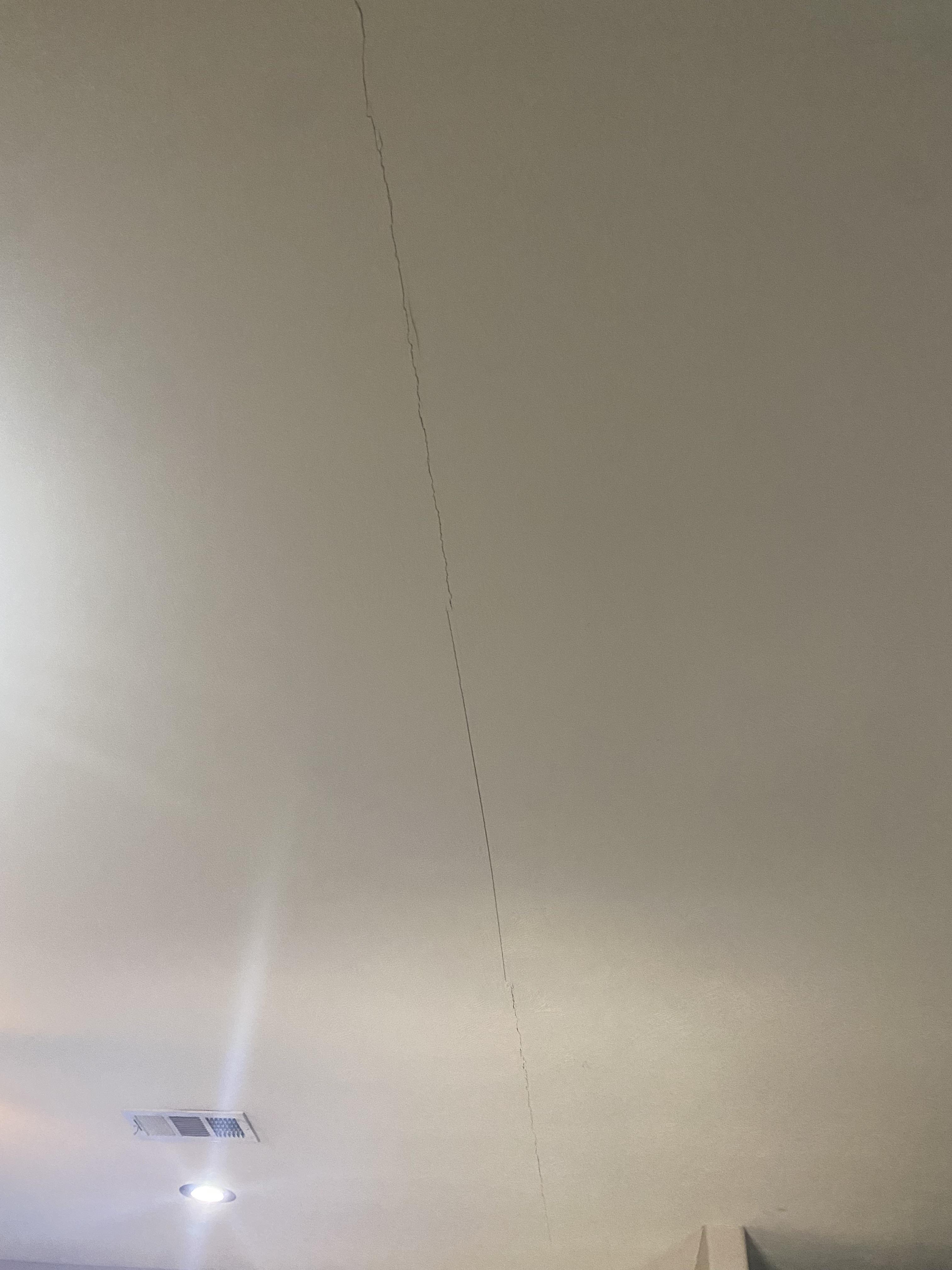 Are these ceiling cracks concerning? They are pretty much all straight except the one coming ...