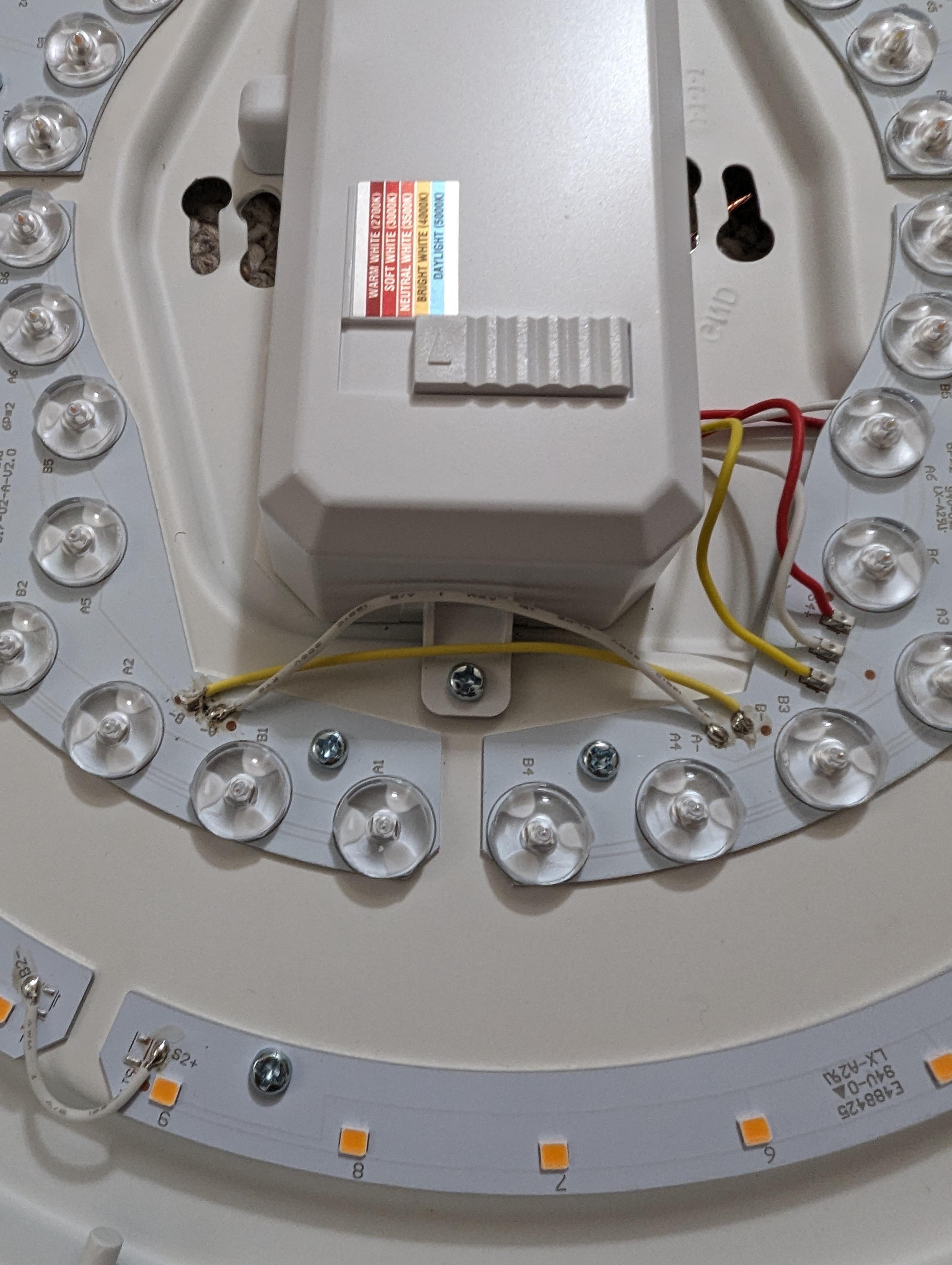 New LED light fixture with dark spots around soldered connections | Scrolller