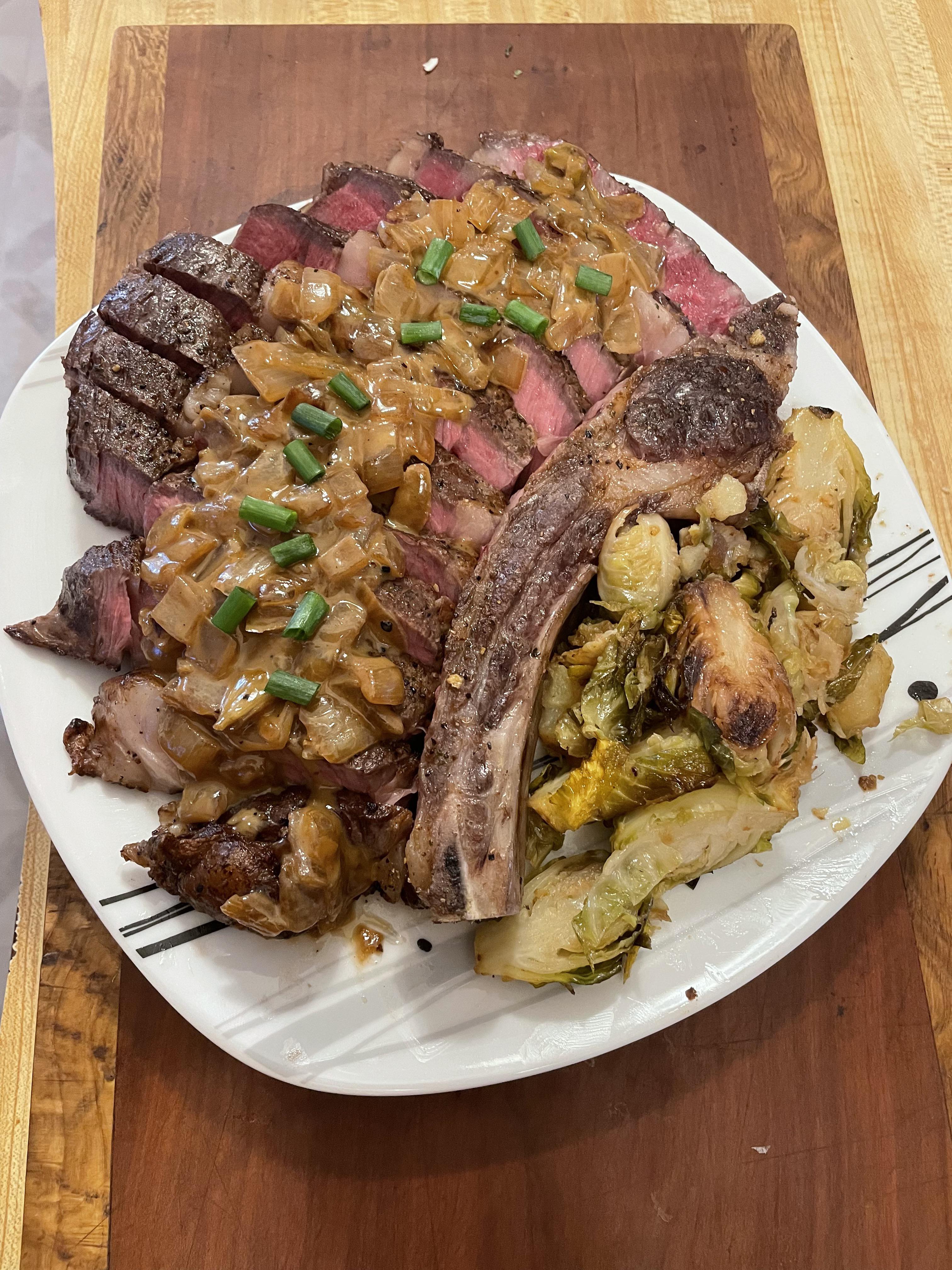 [homemade] I made a thick ribeye. Reverse sear method in cast iron, with veggies and a pan sauce ...