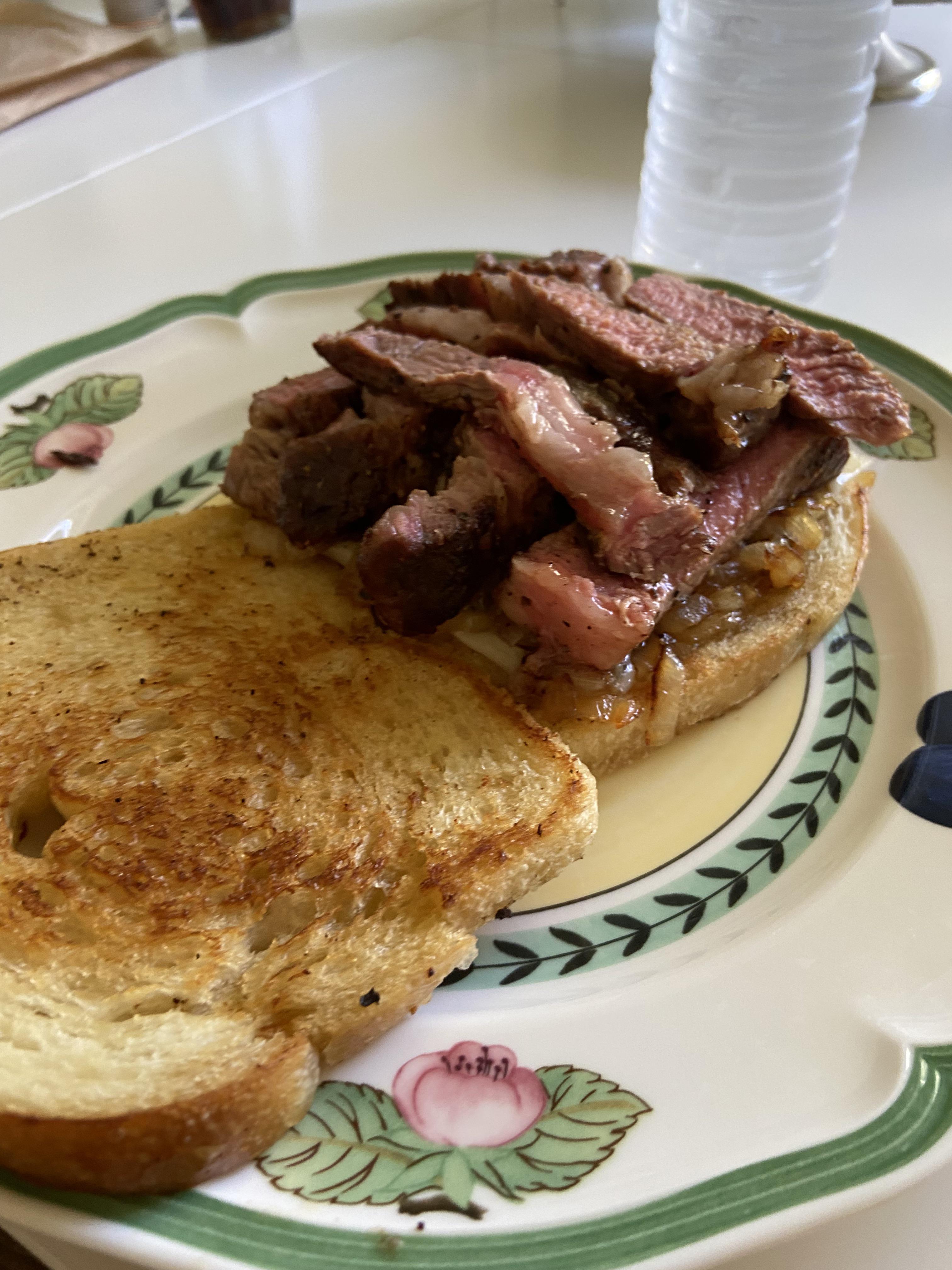 [homemade] sourdough mid-rare ribeye steak sandwich, with caramelized onions and swiss cheese ...