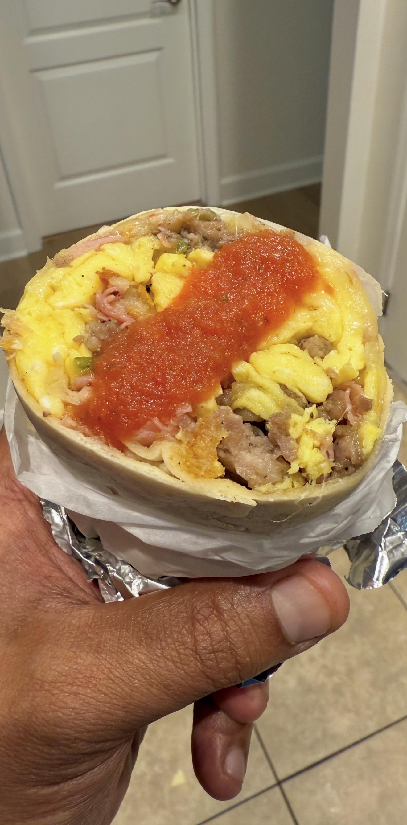 Breakfast burrito with ham, sausage, eggs, potatoes and pepper jack cheese. [homemade] | Scrolller