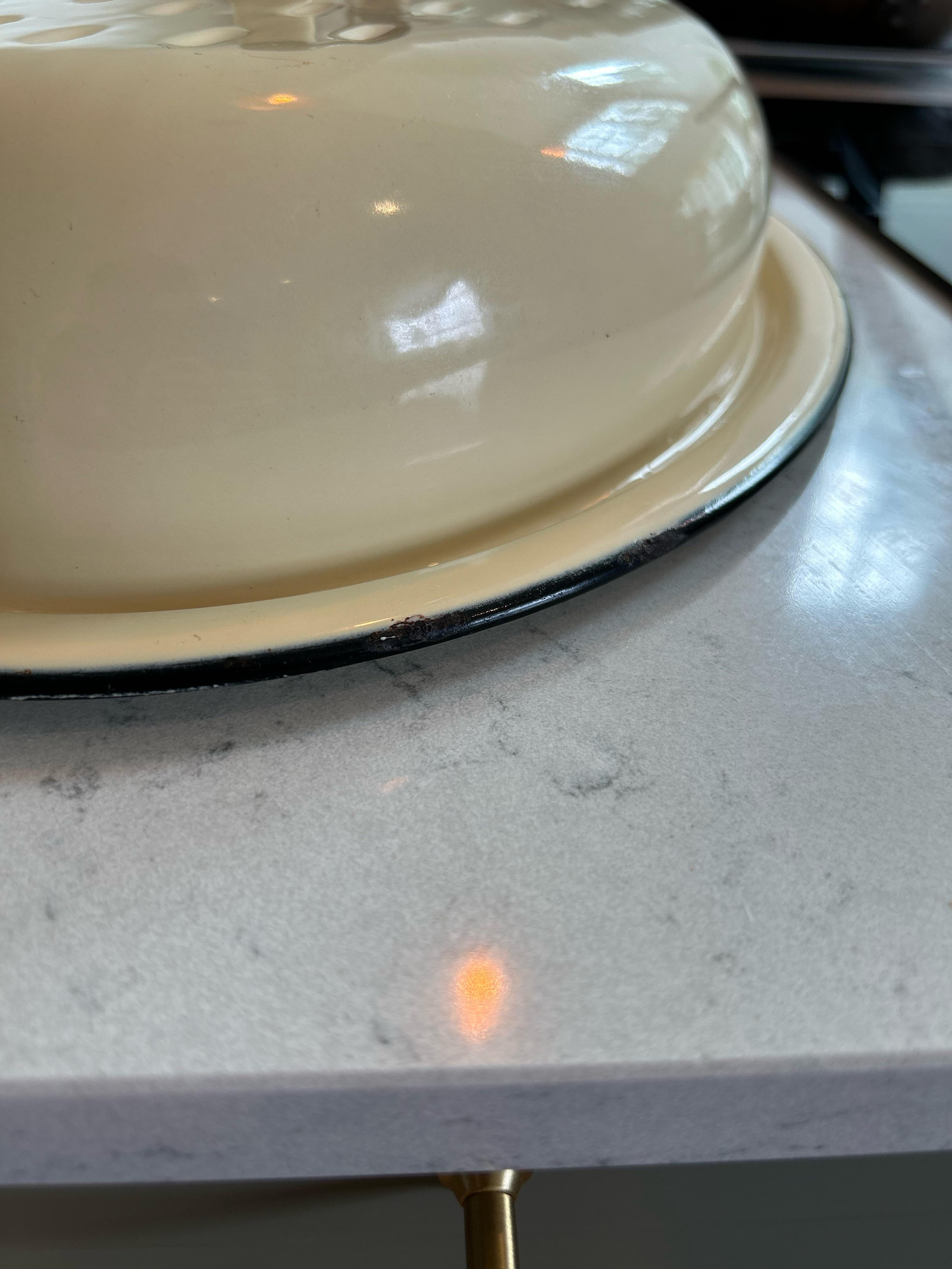 Rust attacked enamel coated cast iron pot. | Scrolller