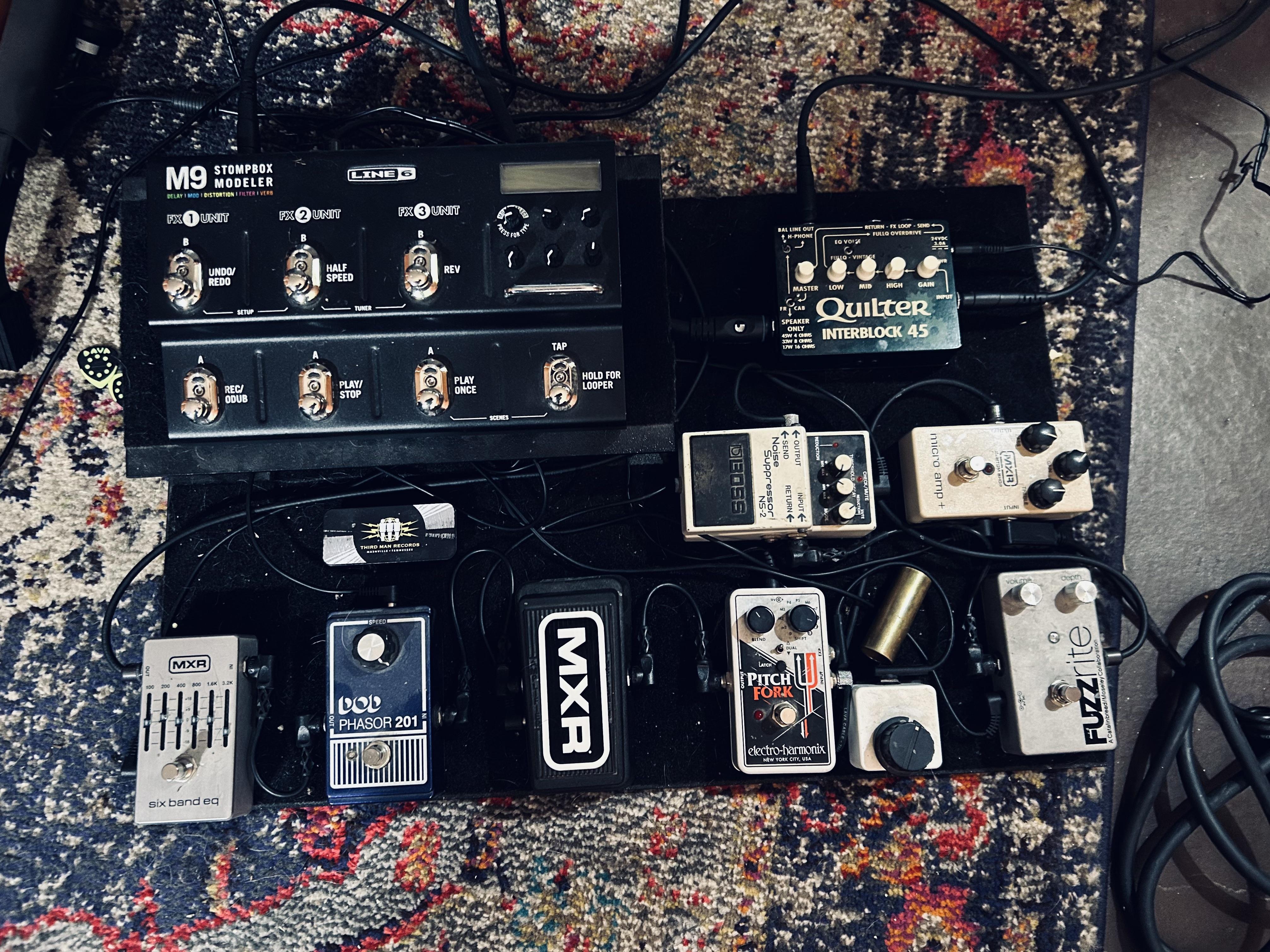 If you don't have a shelf, you can always put your extra pedals in a guitar case! | Scrolller