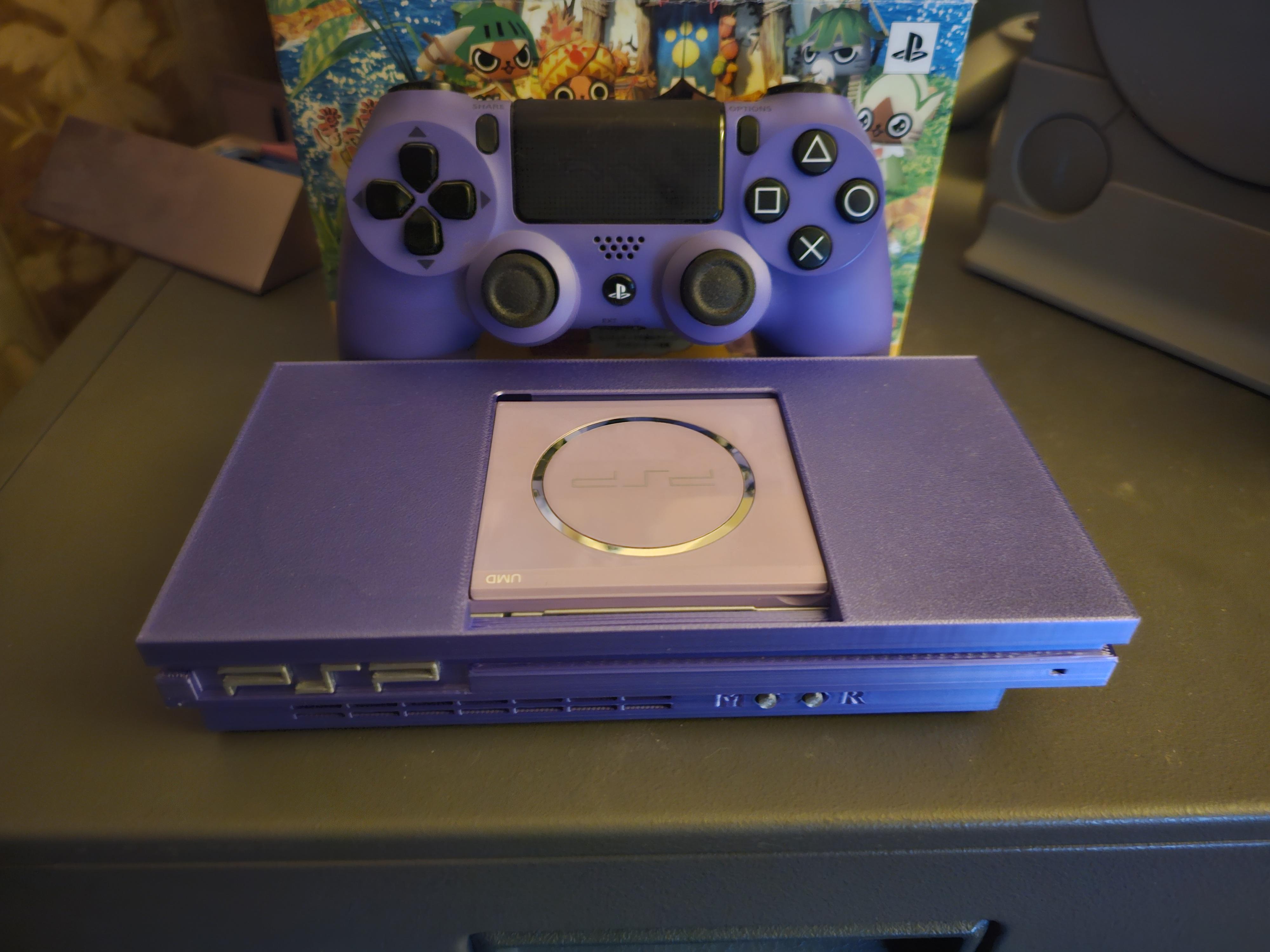 The PS Placeable. A consolized PSP mod made from a Lilac Purple Poka Poka Airou edition 3000 PSP ...