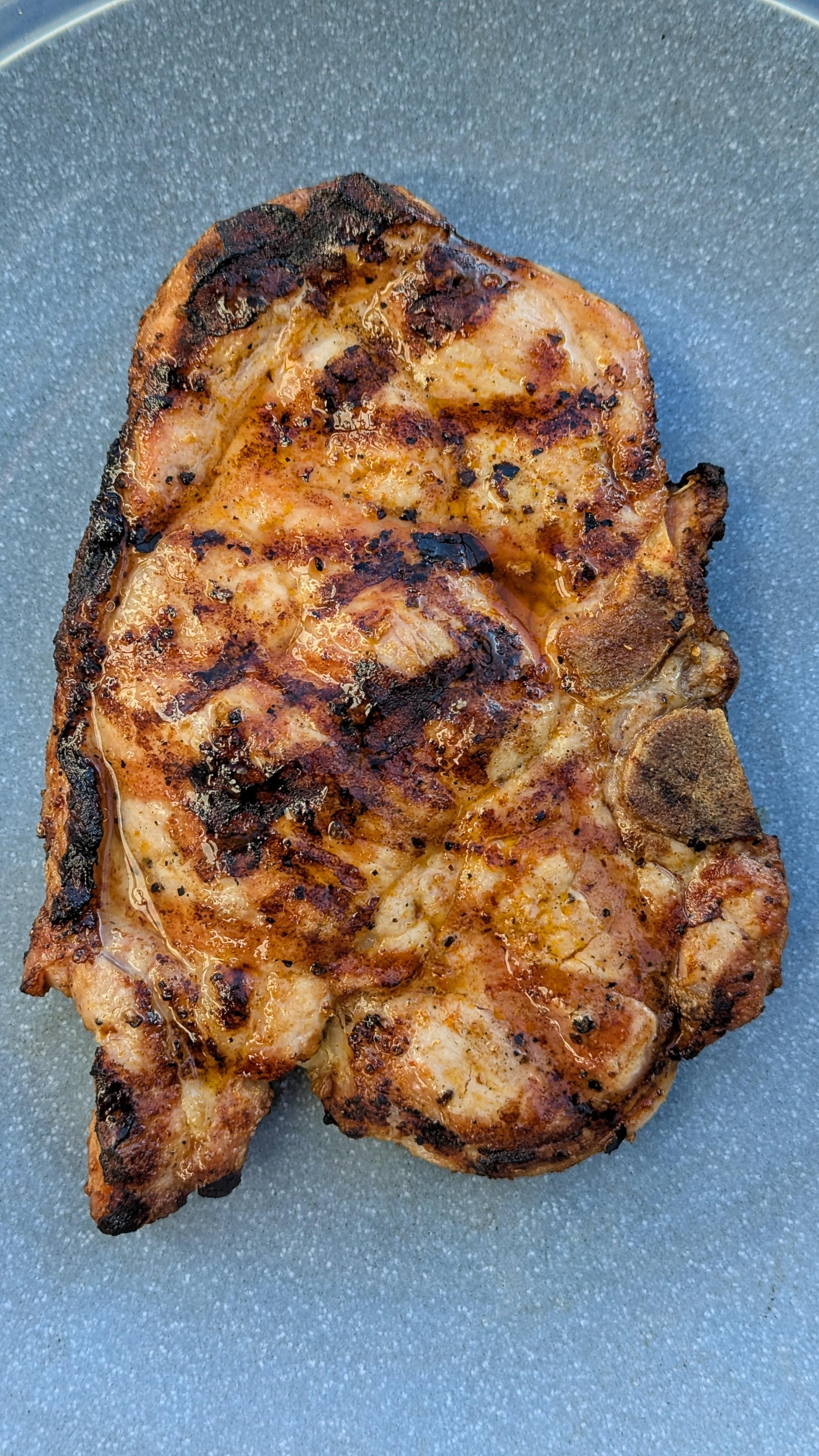 Thick center cut pork chop just off the grill 🔥⭐ | Scrolller